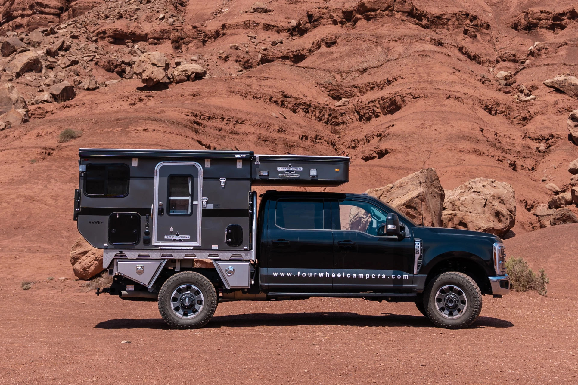 Four Wheel Campers Hawk+ self-contained off-grid pickup truck camper