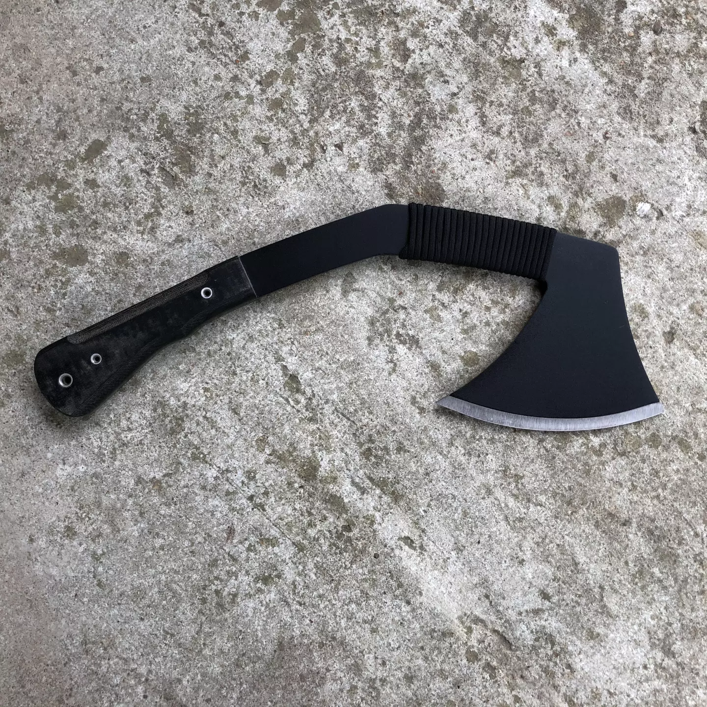 Kukrax survival axe takes a tactical tomahawk and makes it curvy
