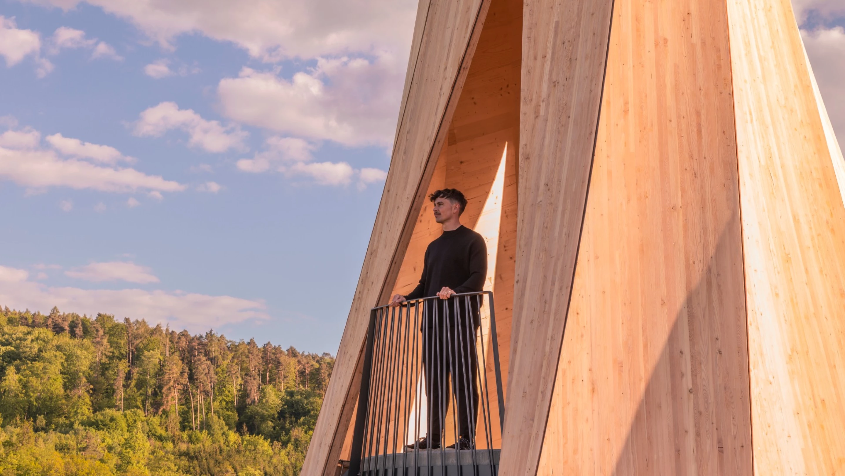 "World-first" twisting tower is made from timber that bends itself into ...