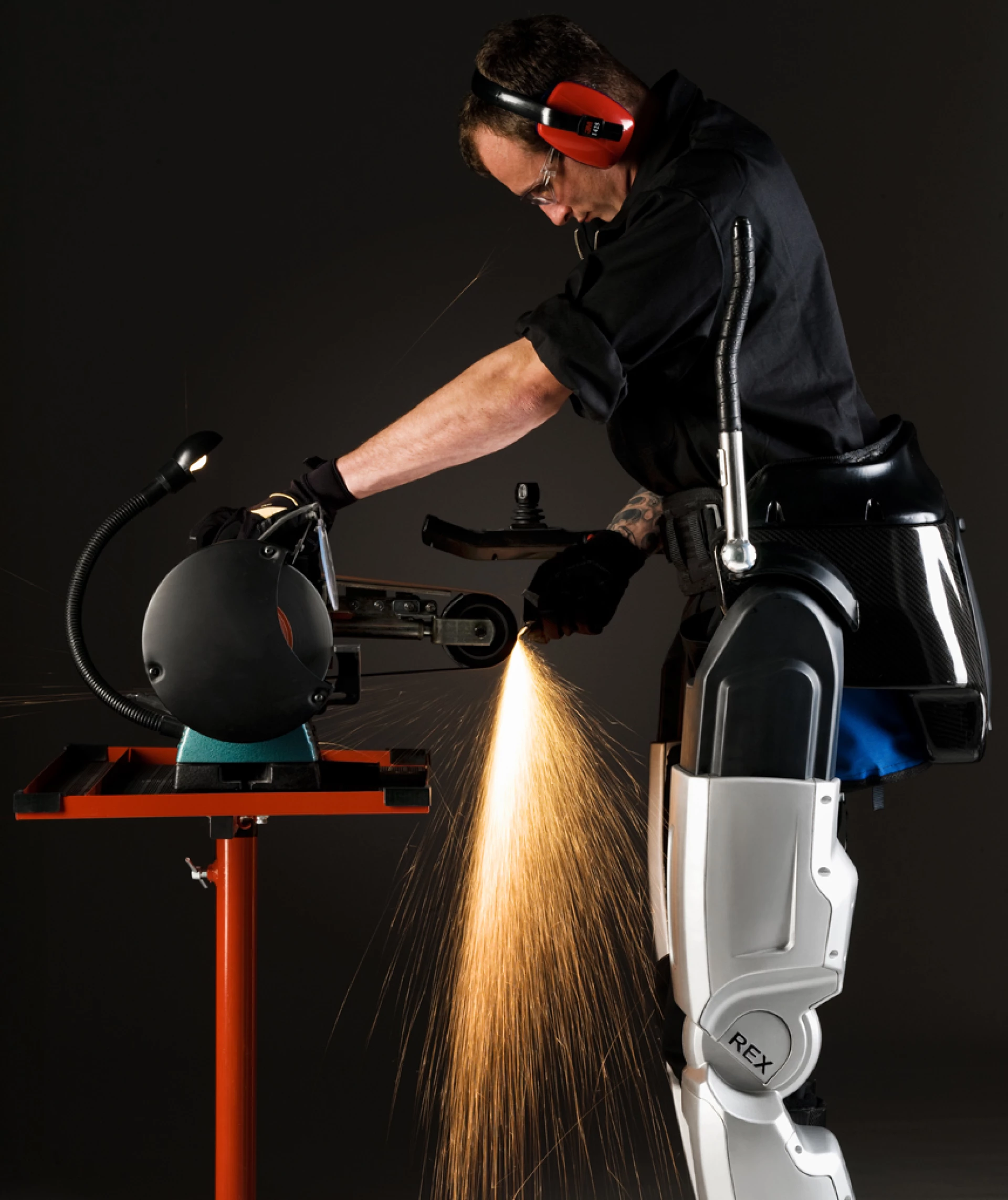 REX robotic exoskeleton gets wheelchair users back on their feet