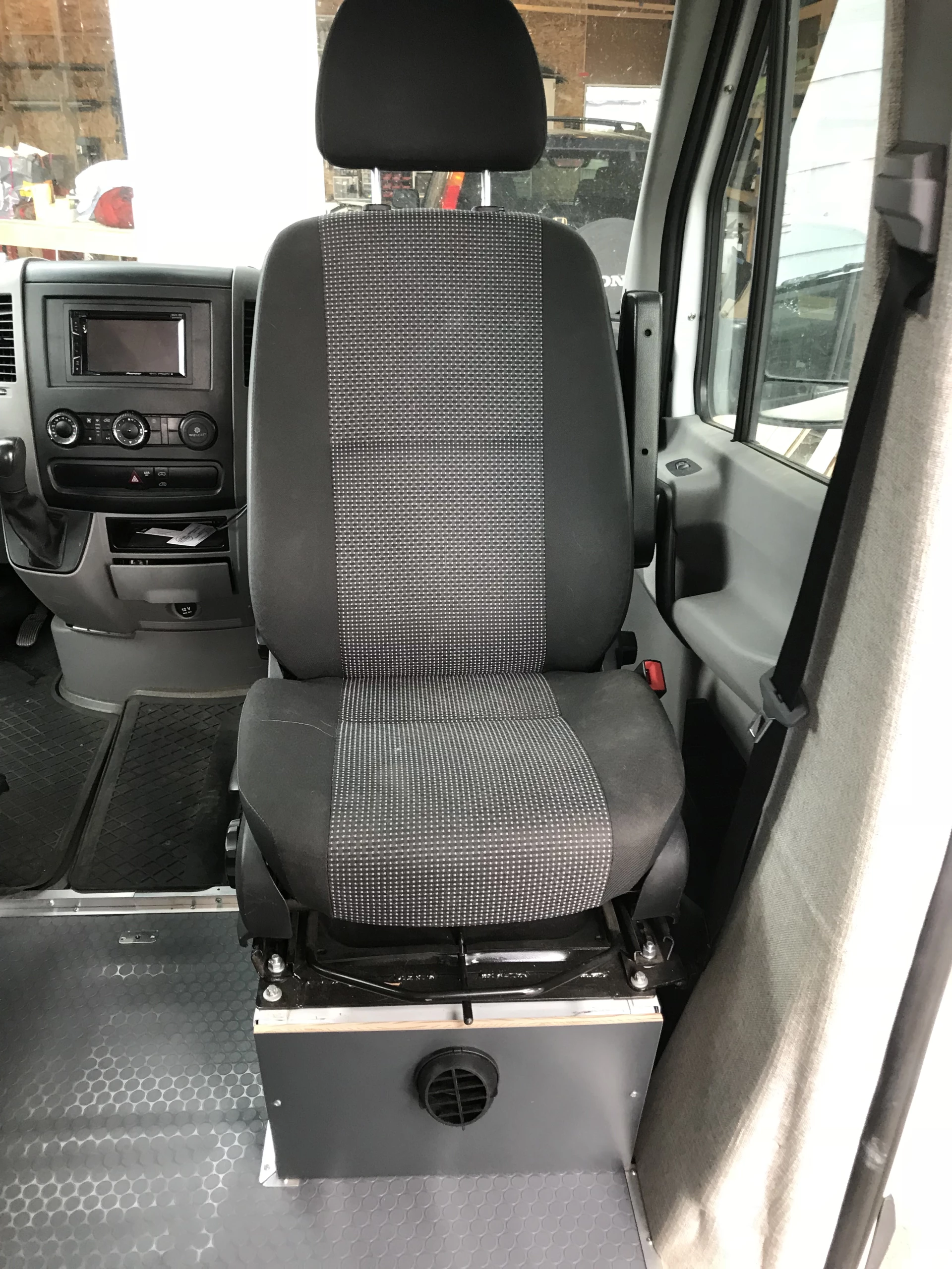 Ultimate gear head camper van clears space with foldaway bathroom