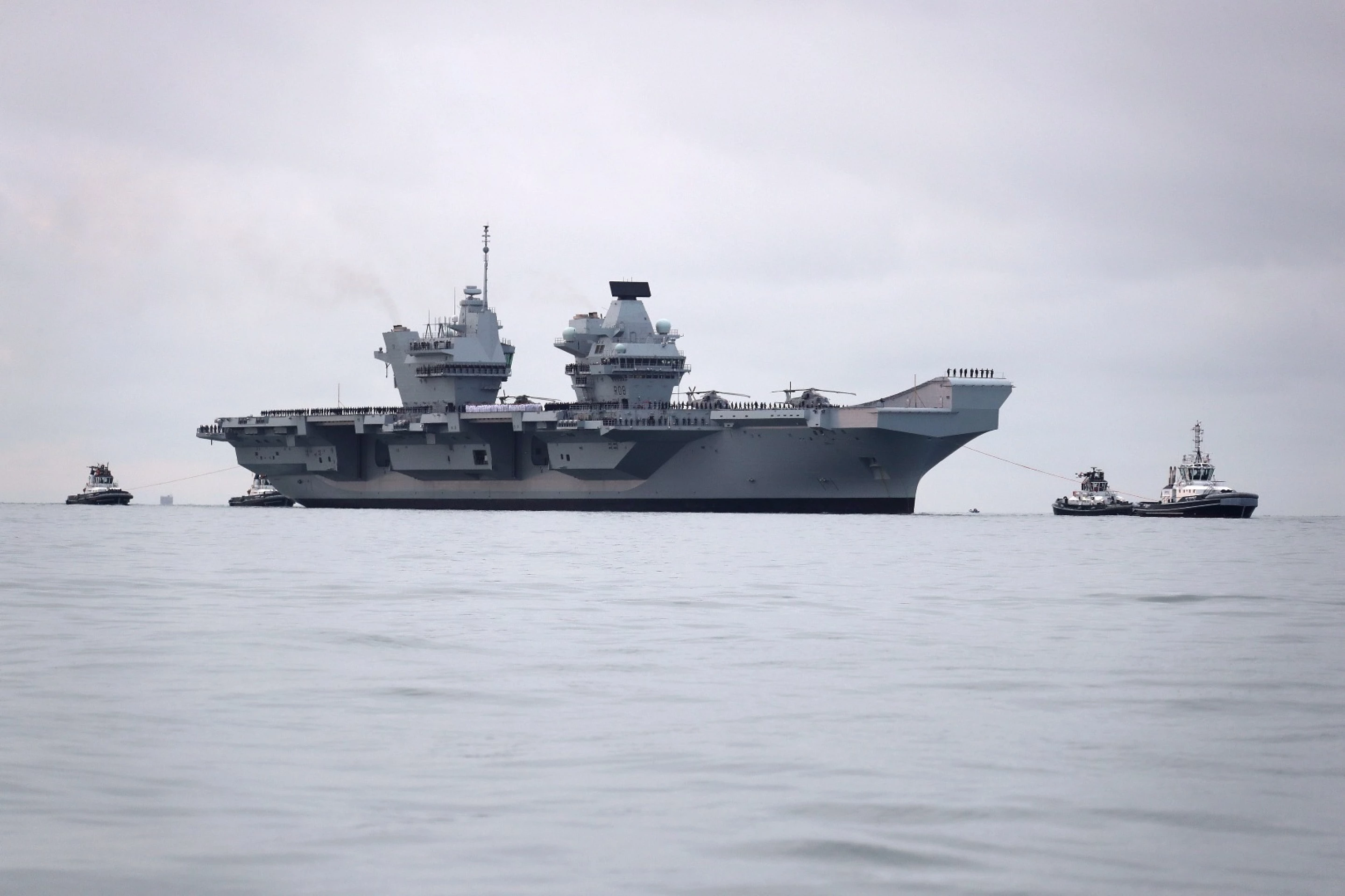 The Royal Navy's largest-ever warship comes home for the first time