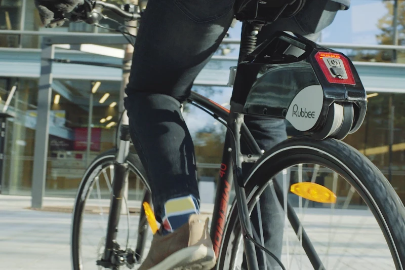 Rubbee is back in the back, with a new add-on electric bike motor