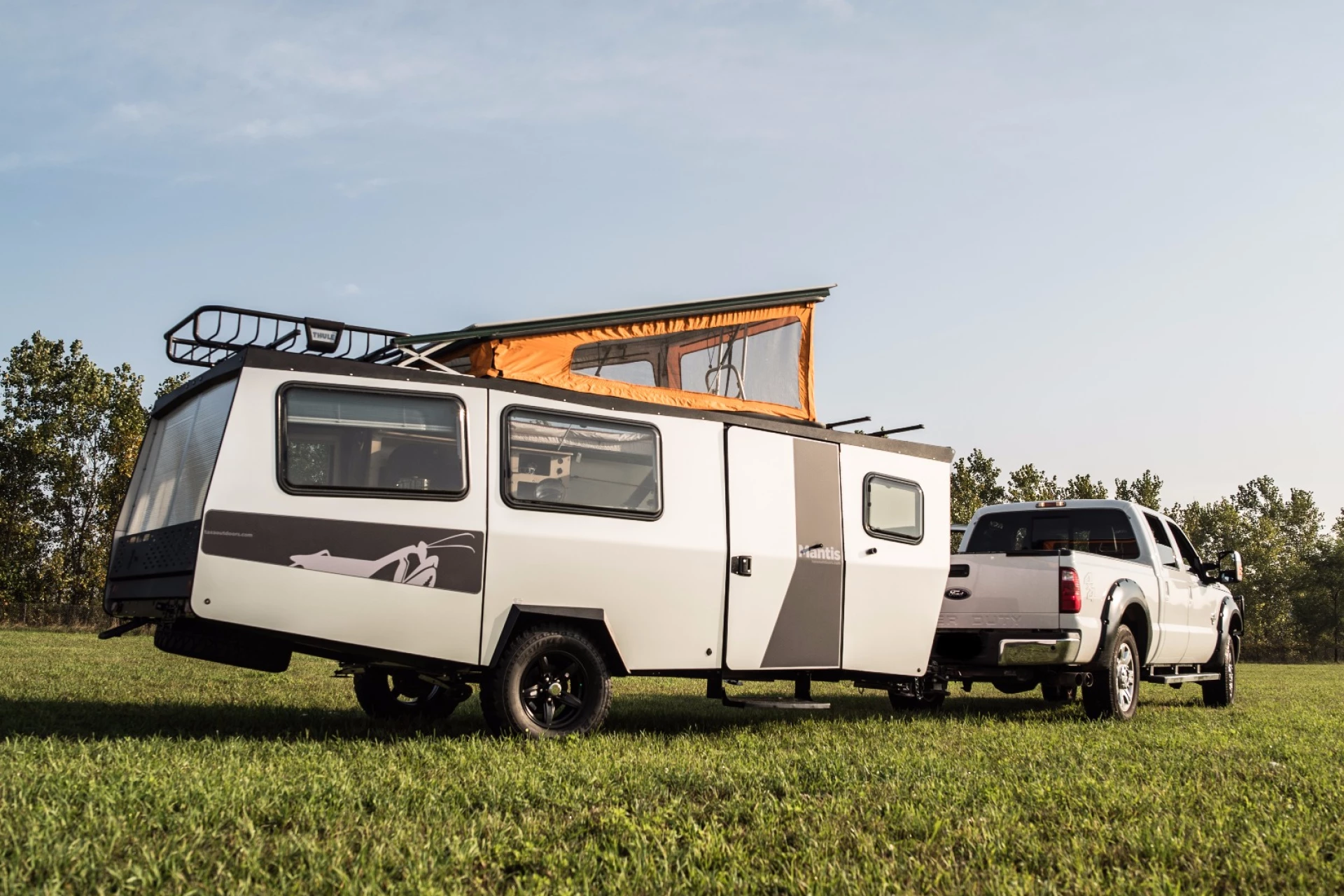 Taxa stretches its forelegs with the Mantis camping trailer