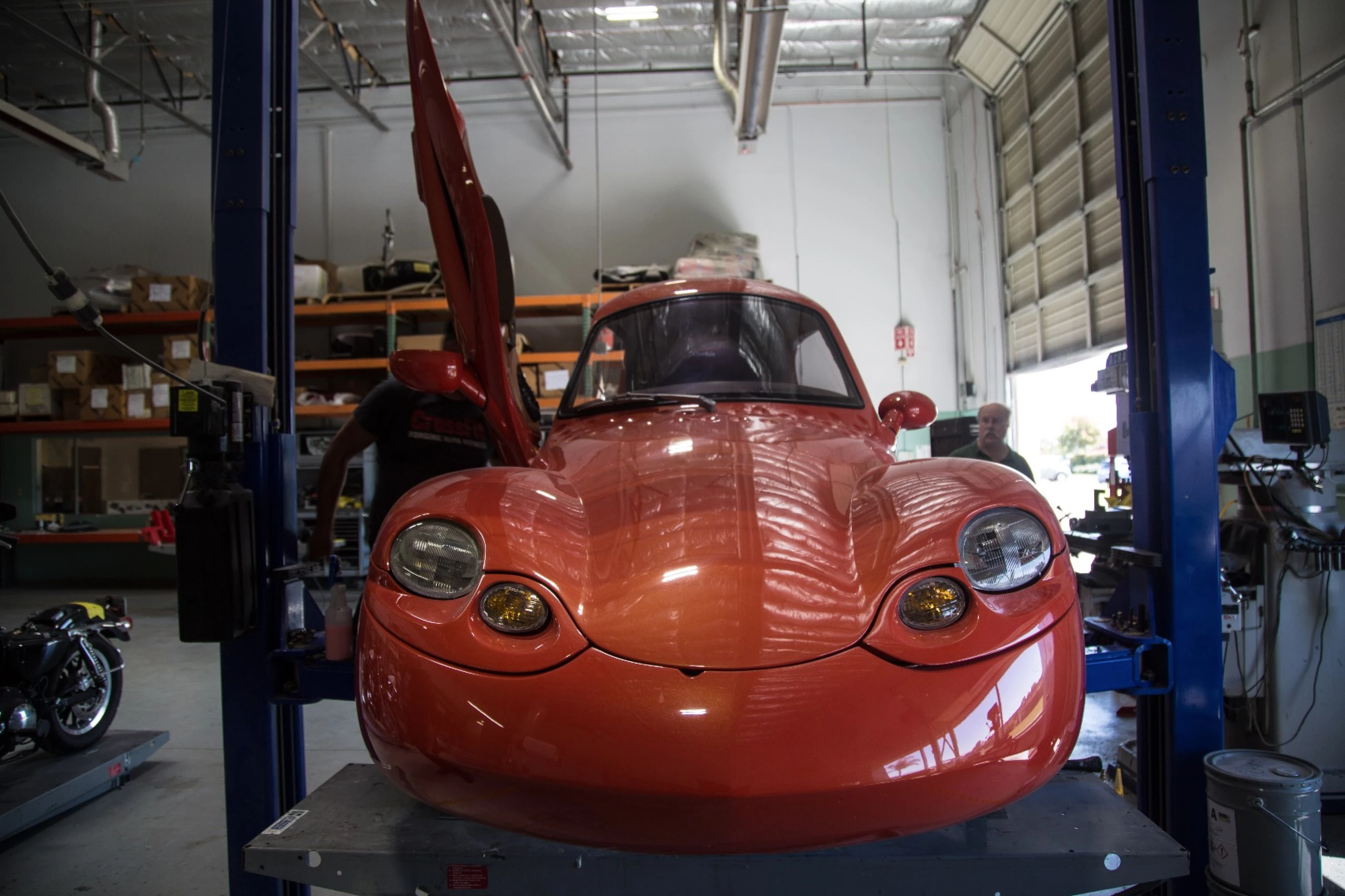 Corbin Sparrow electric three-wheeler, now with dimpled backside
