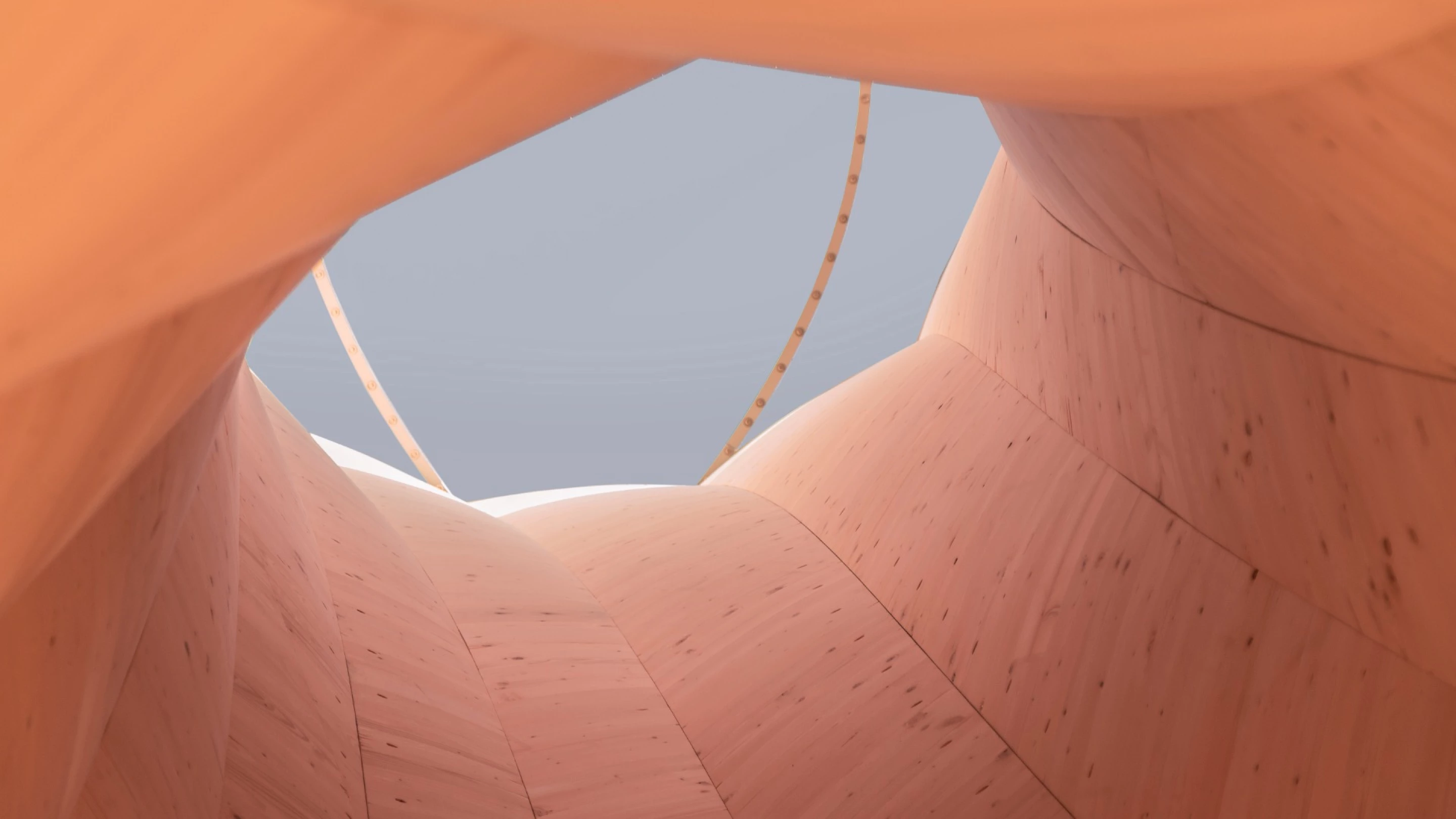 "World-first" twisting tower is made from timber that bends itself into ...