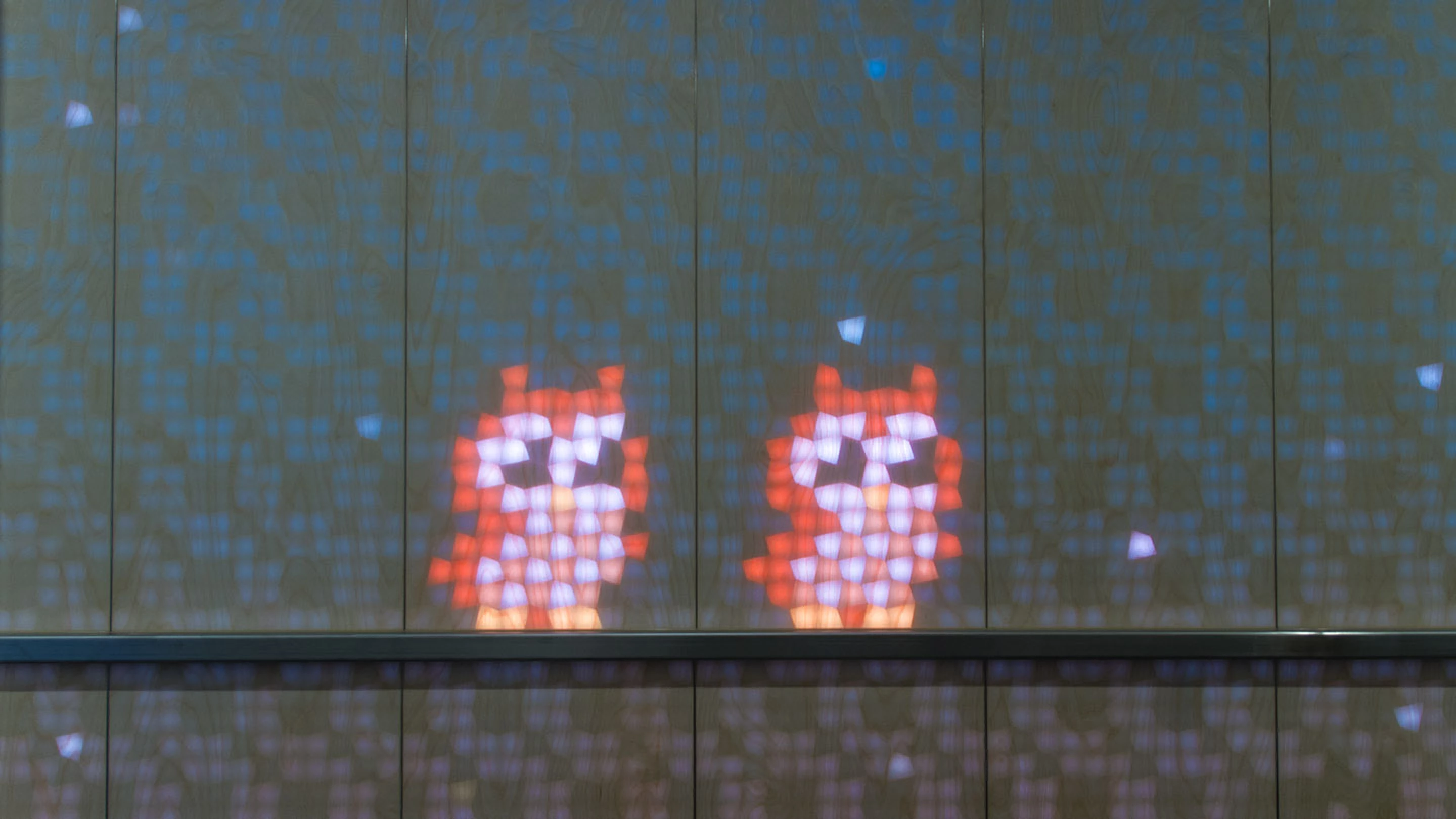 Motion-sensing wall panels animate boring interiors