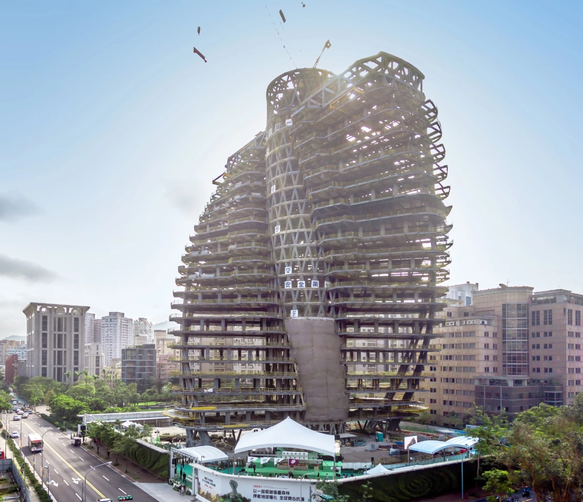 Vincent Callebaut's twisting tree-covered tower takes shape in Taipei