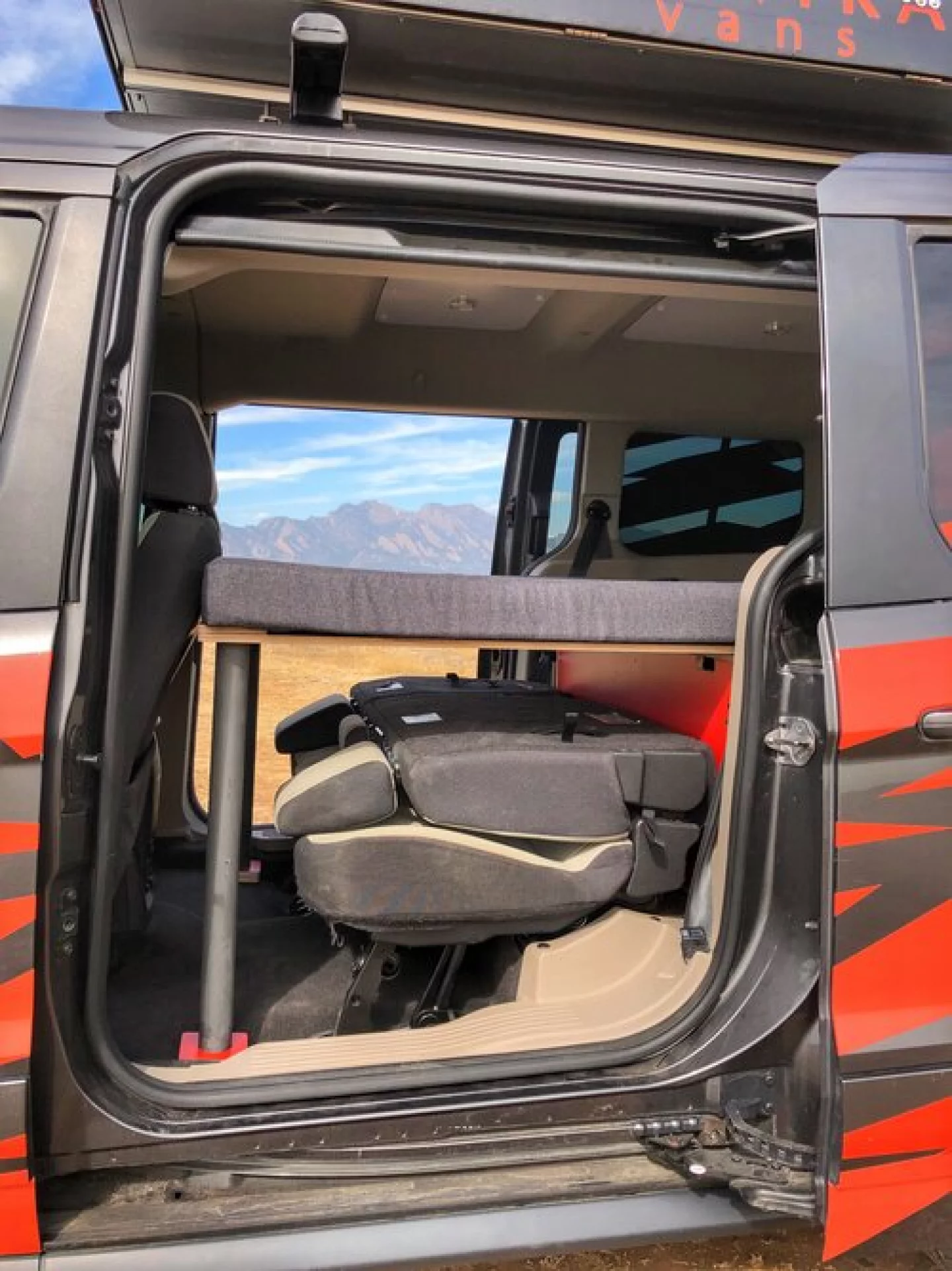 Fiery $35K+ Ford mini-campervan seats and sleeps a family of five