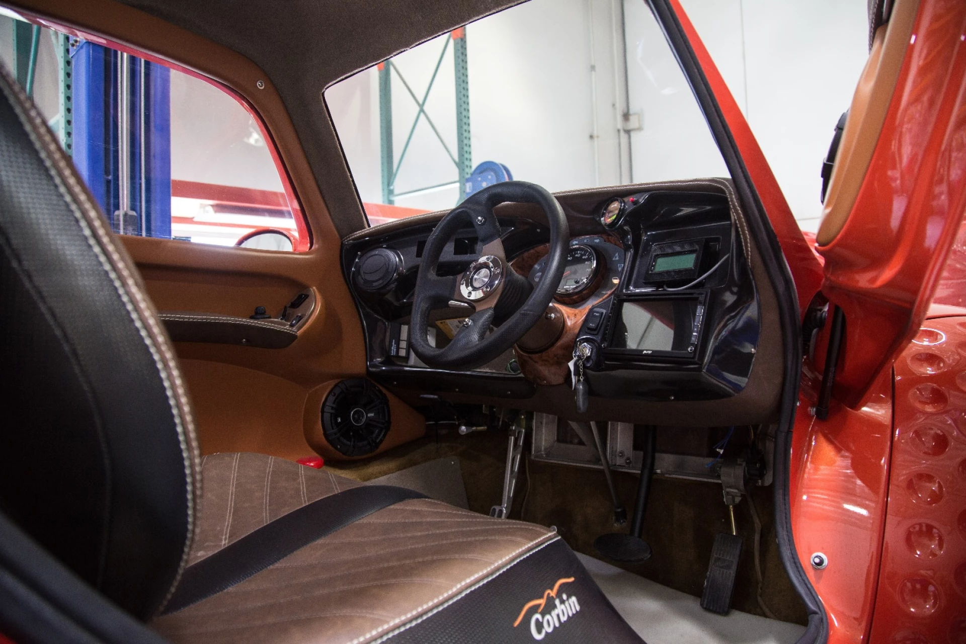 Corbin Sparrow electric three-wheeler, now with dimpled backside