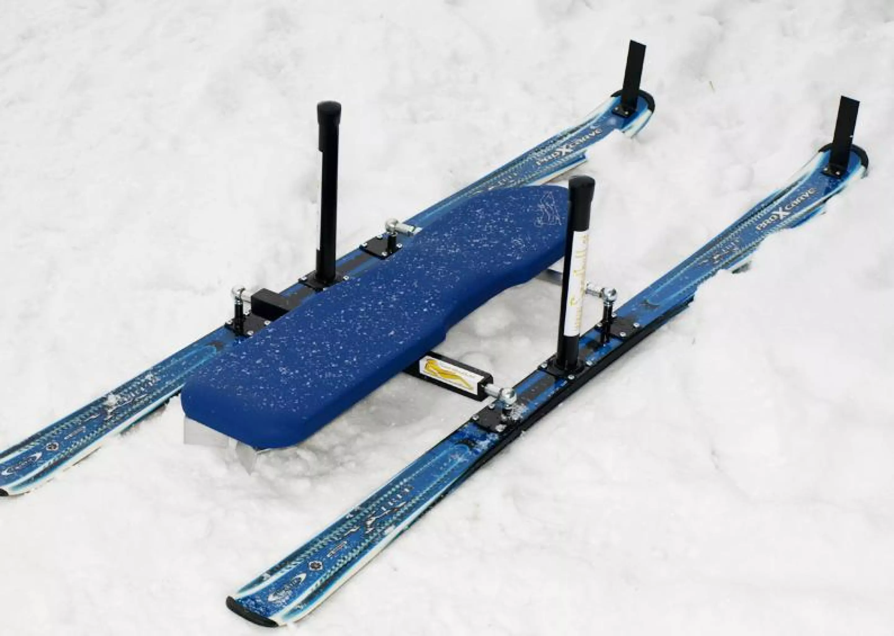 Snowbull sled takes skiing lying down