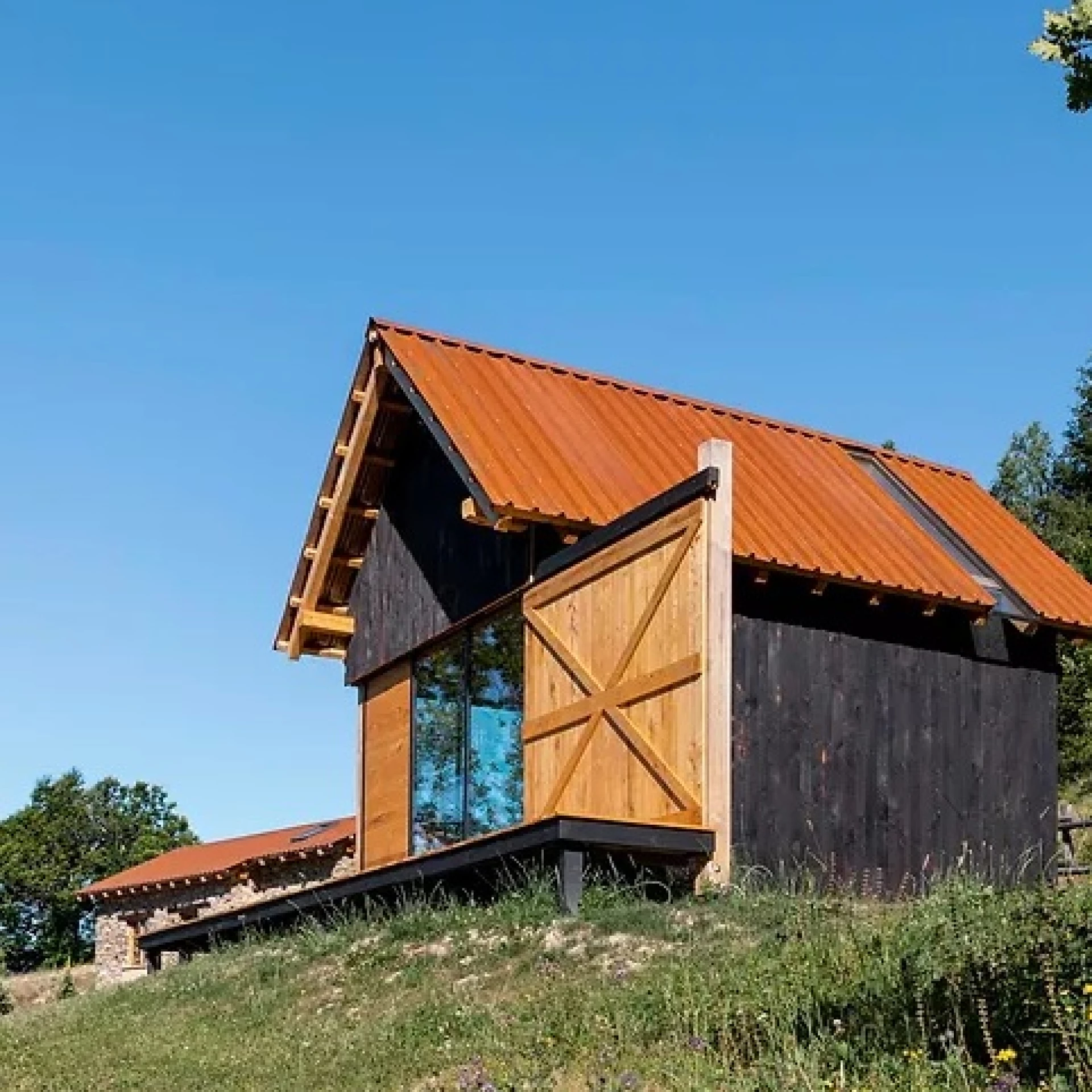 Micro-cabin in Ligurian Alps features a bed that can be rolled outside