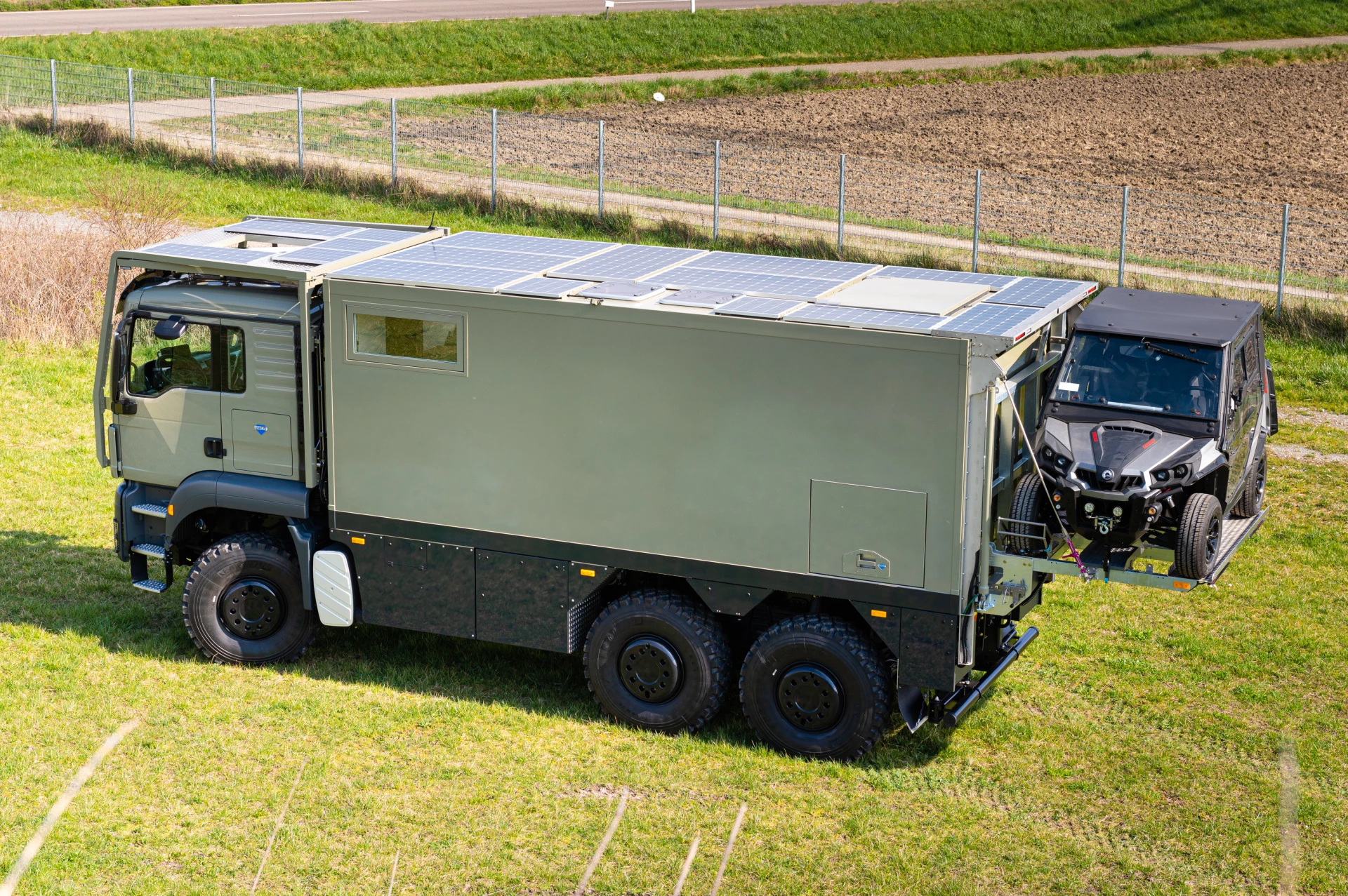 $1.5 million 6x6 motorhome roams off-grid with four people and an ATV