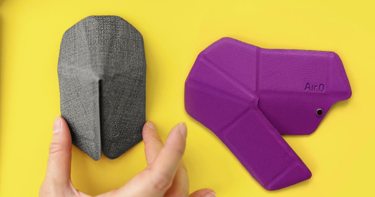 Air.0 origami computer mouse folds flat to be packed away