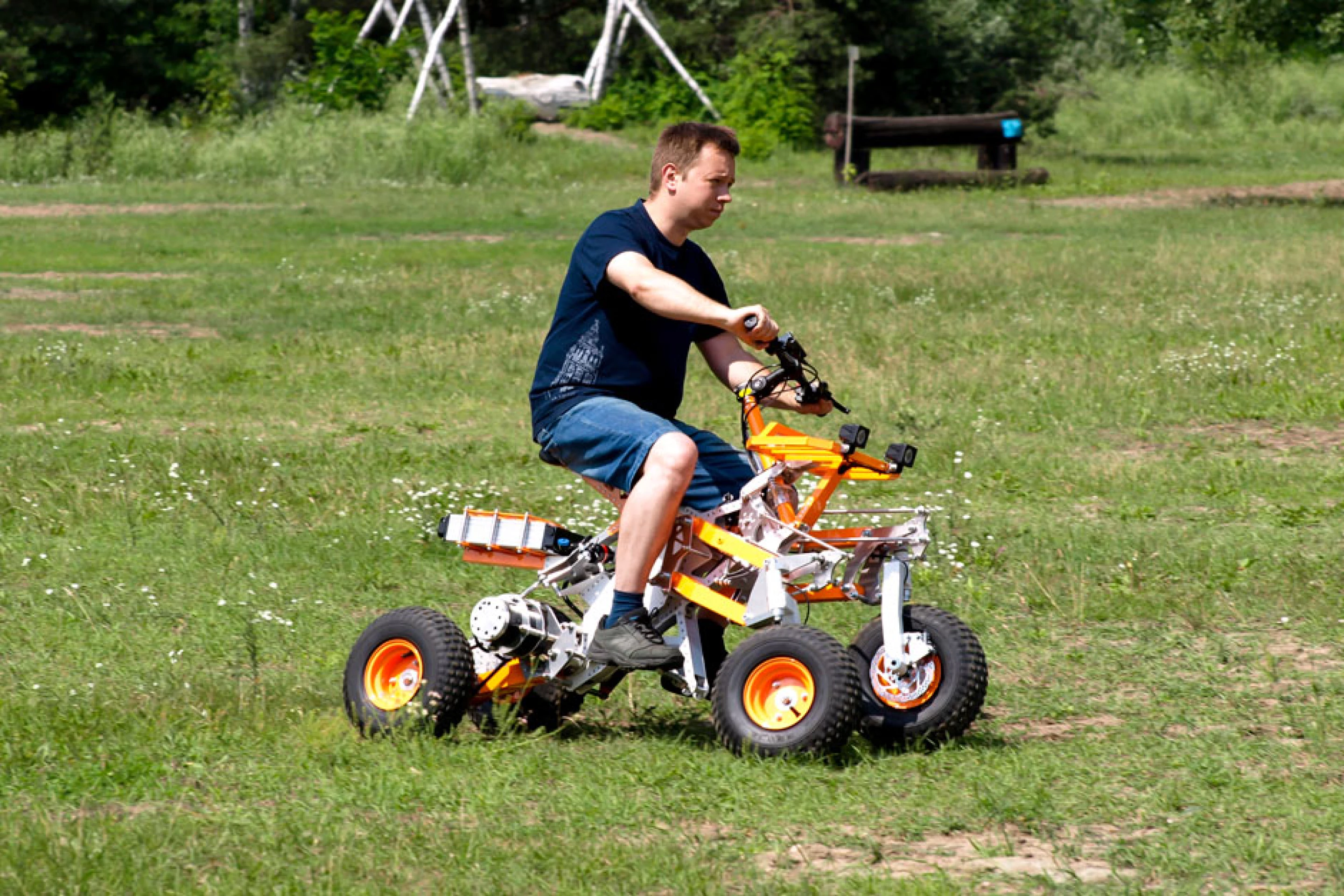 Tilting electric quad gets menacing off-road big brother