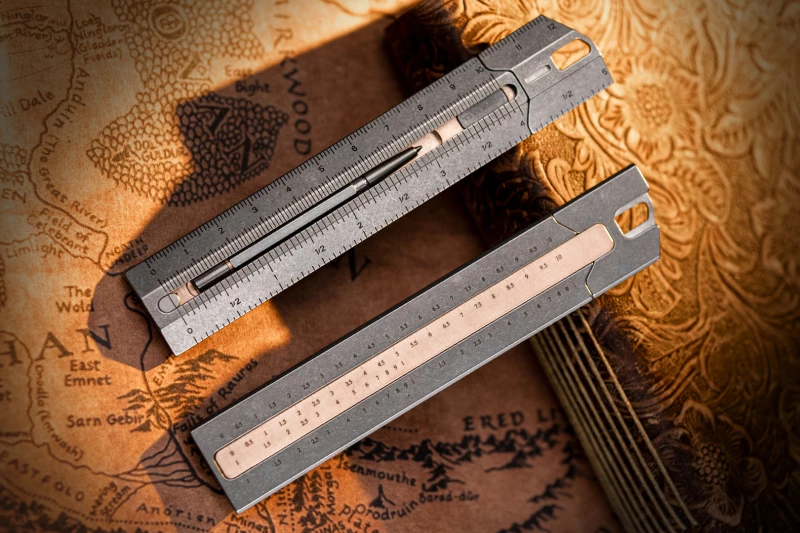 Brainy extendable titanium ruler packs a caliper, pen and slide rule