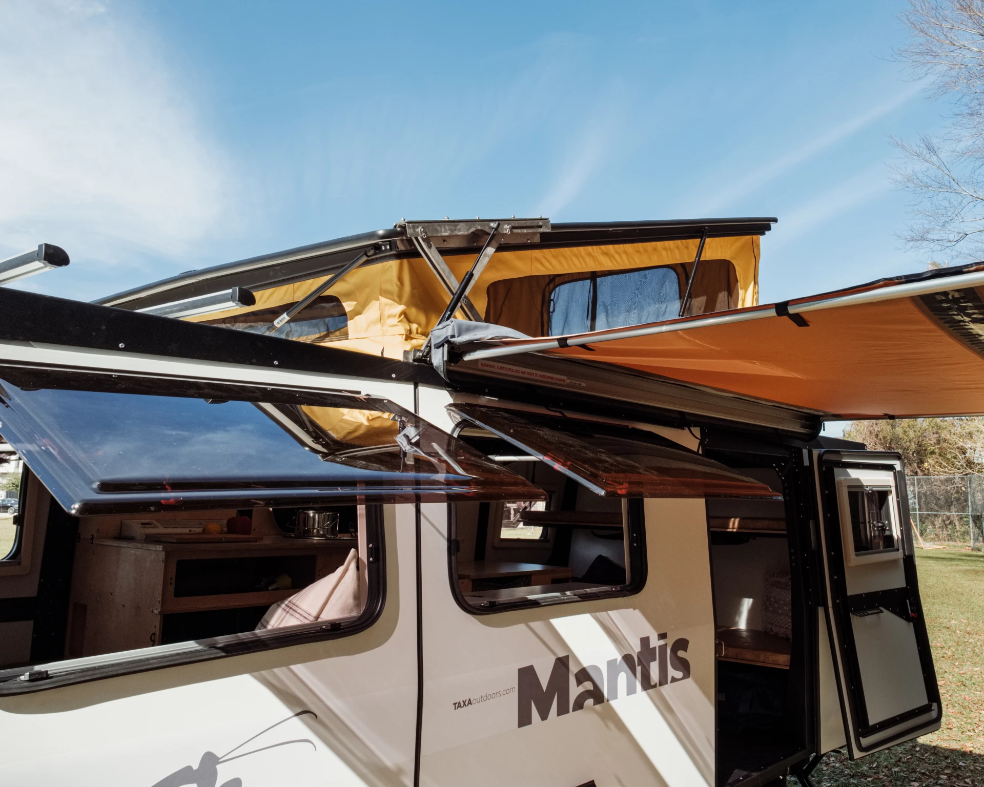 Taxa adds a few new tricks to its funky Mantis camping trailer