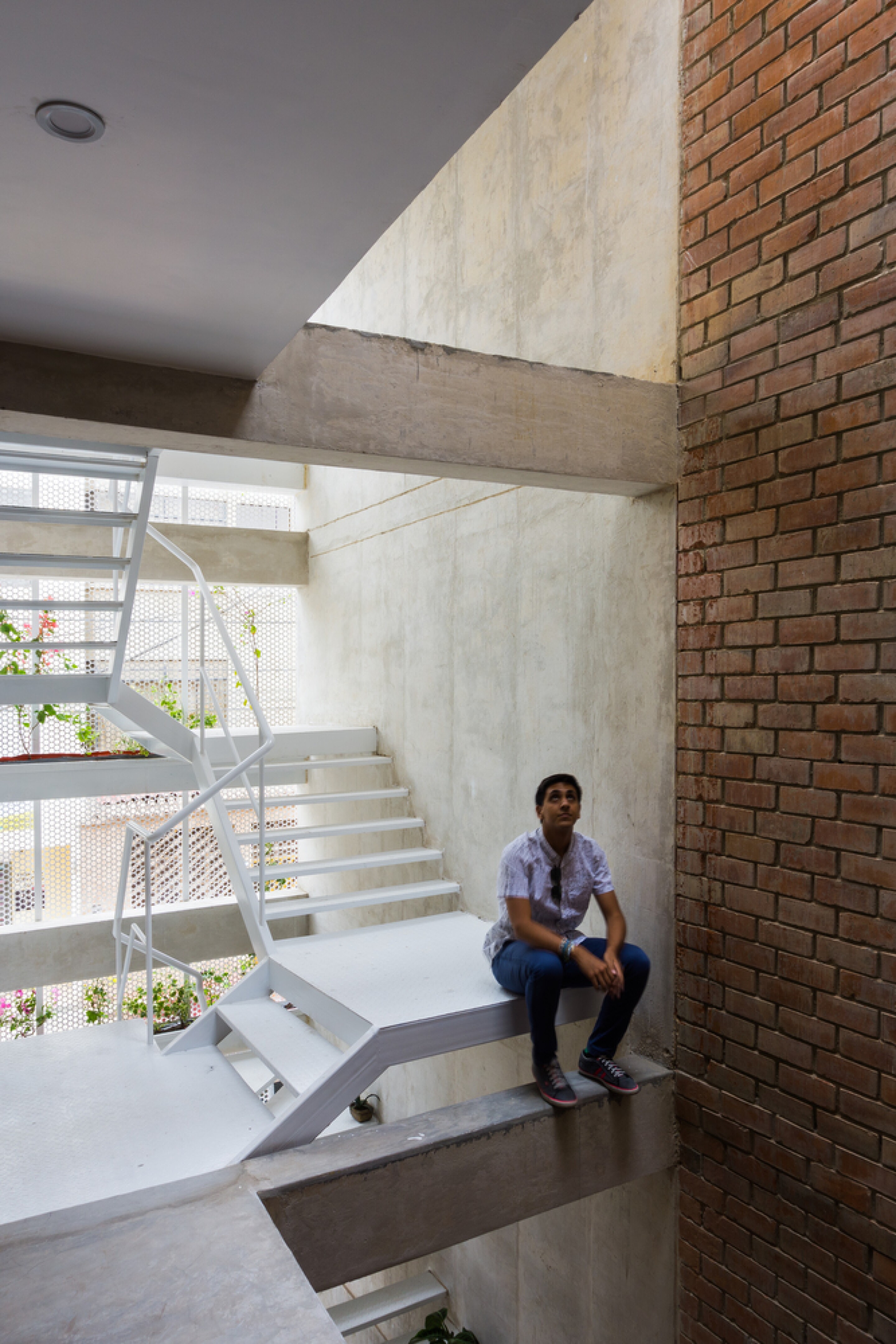 Peruvian architects salvage abandoned building with a garden facade