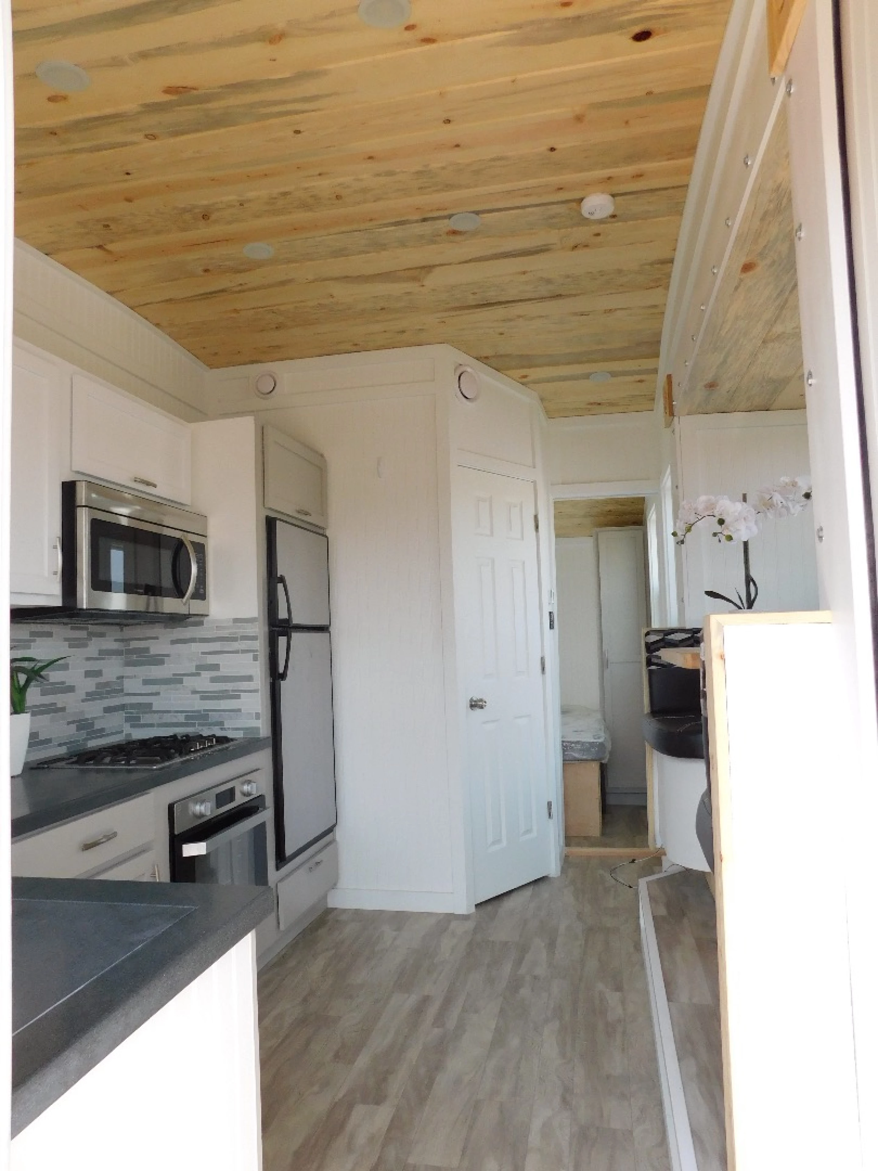Slide-out makes compact tiny house a little less compact