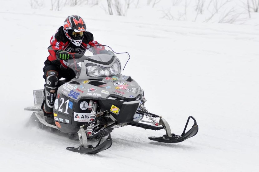 Electric sleds compete in the 12th annual Clean Snowmobile Challenge