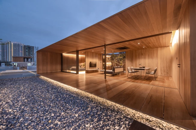 "Borderless" rooftop home pops out of the night sky