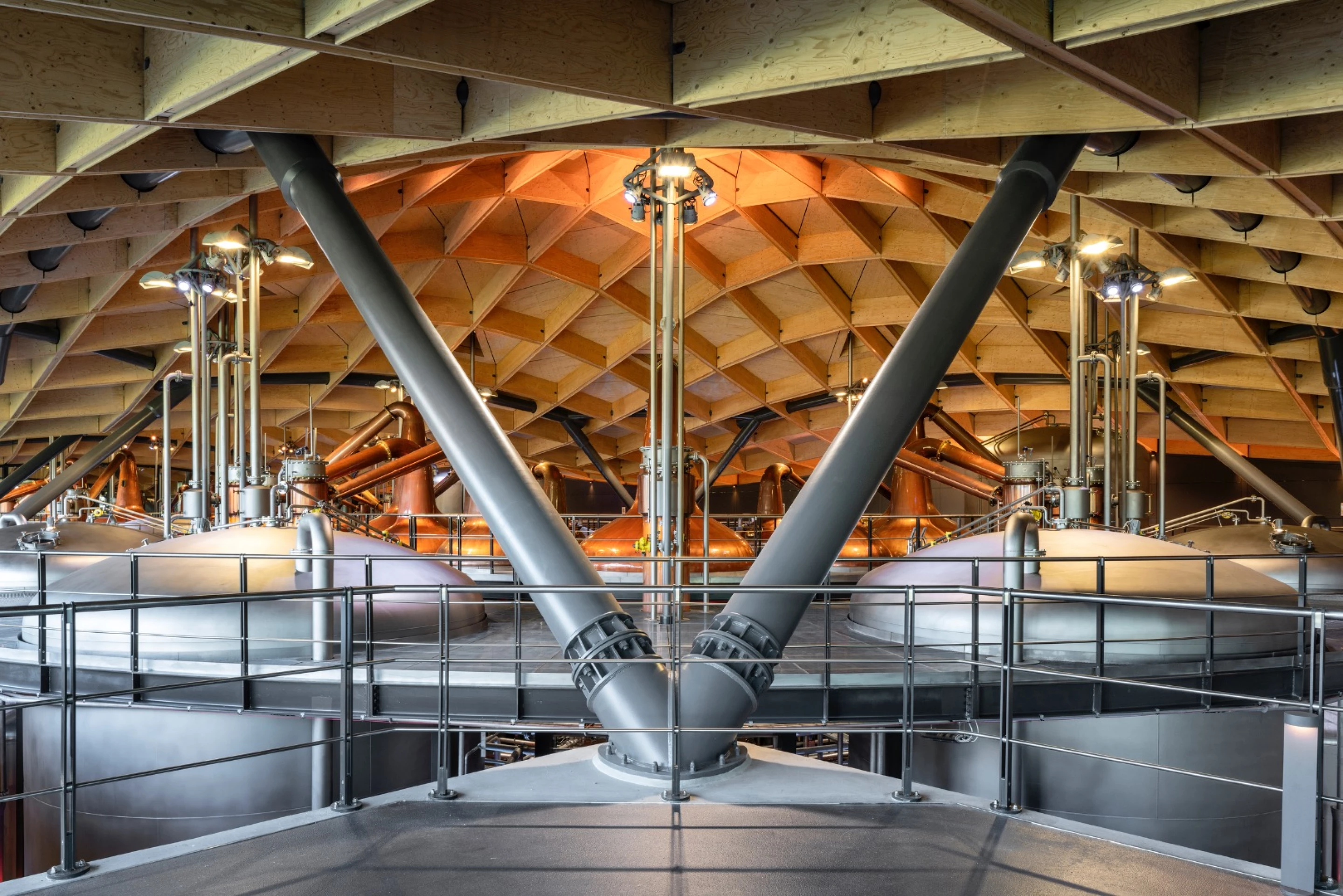 Scottish whisky distillery blends into the landscape with undulating ...