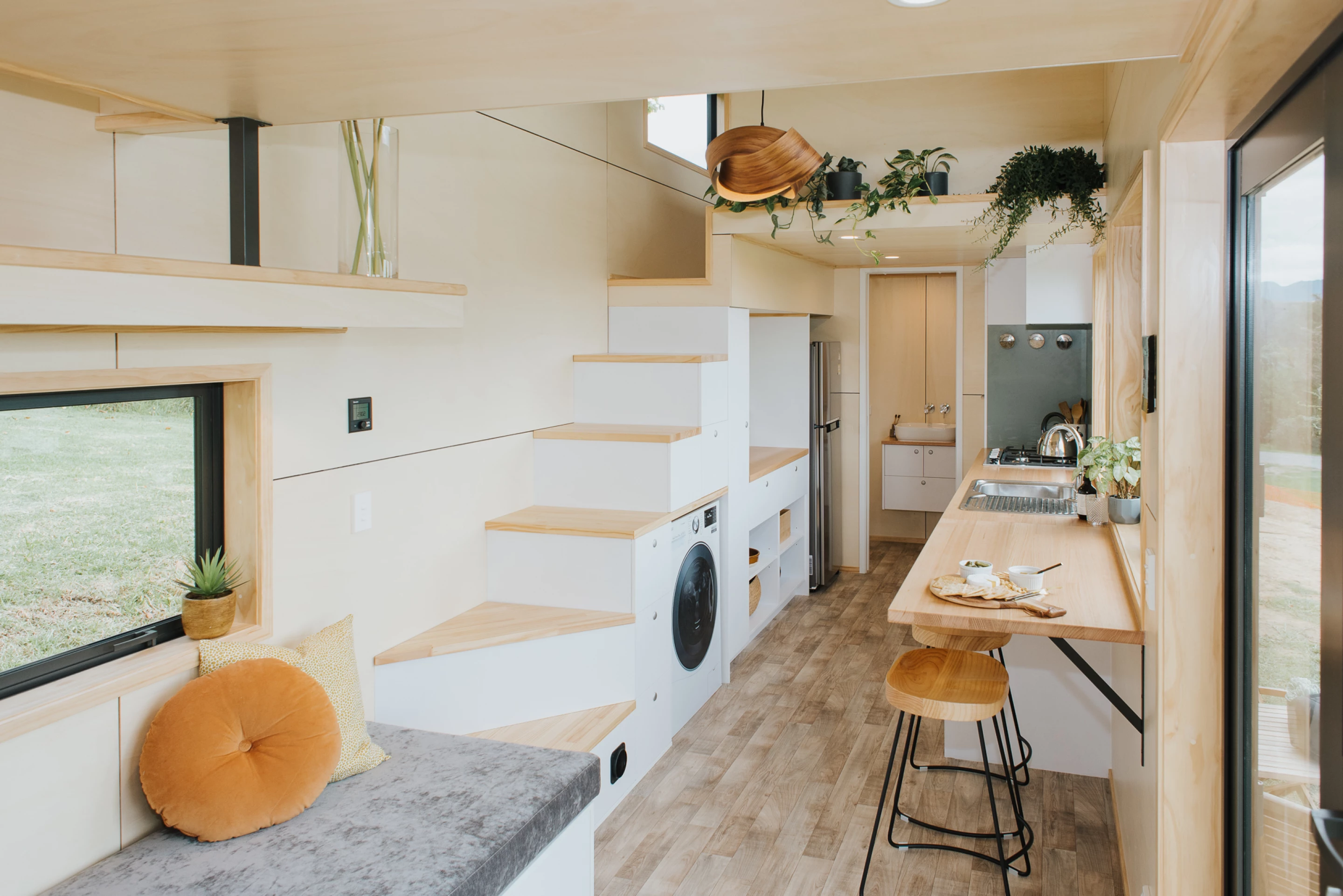 Nugget tiny house doubles up on staircases and storage space