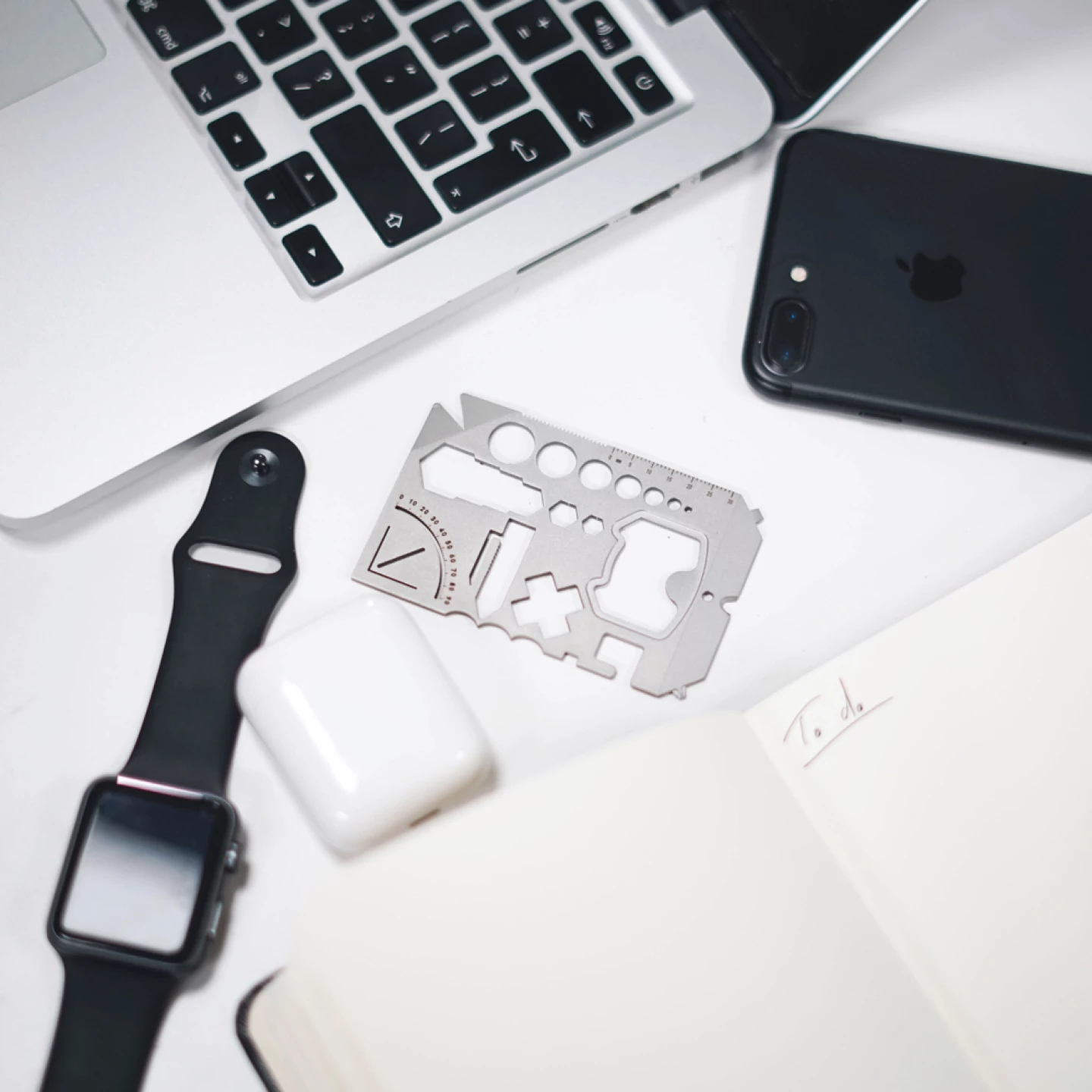 MultiCard Multitool slides out of your wallet to perform over 21 tasks