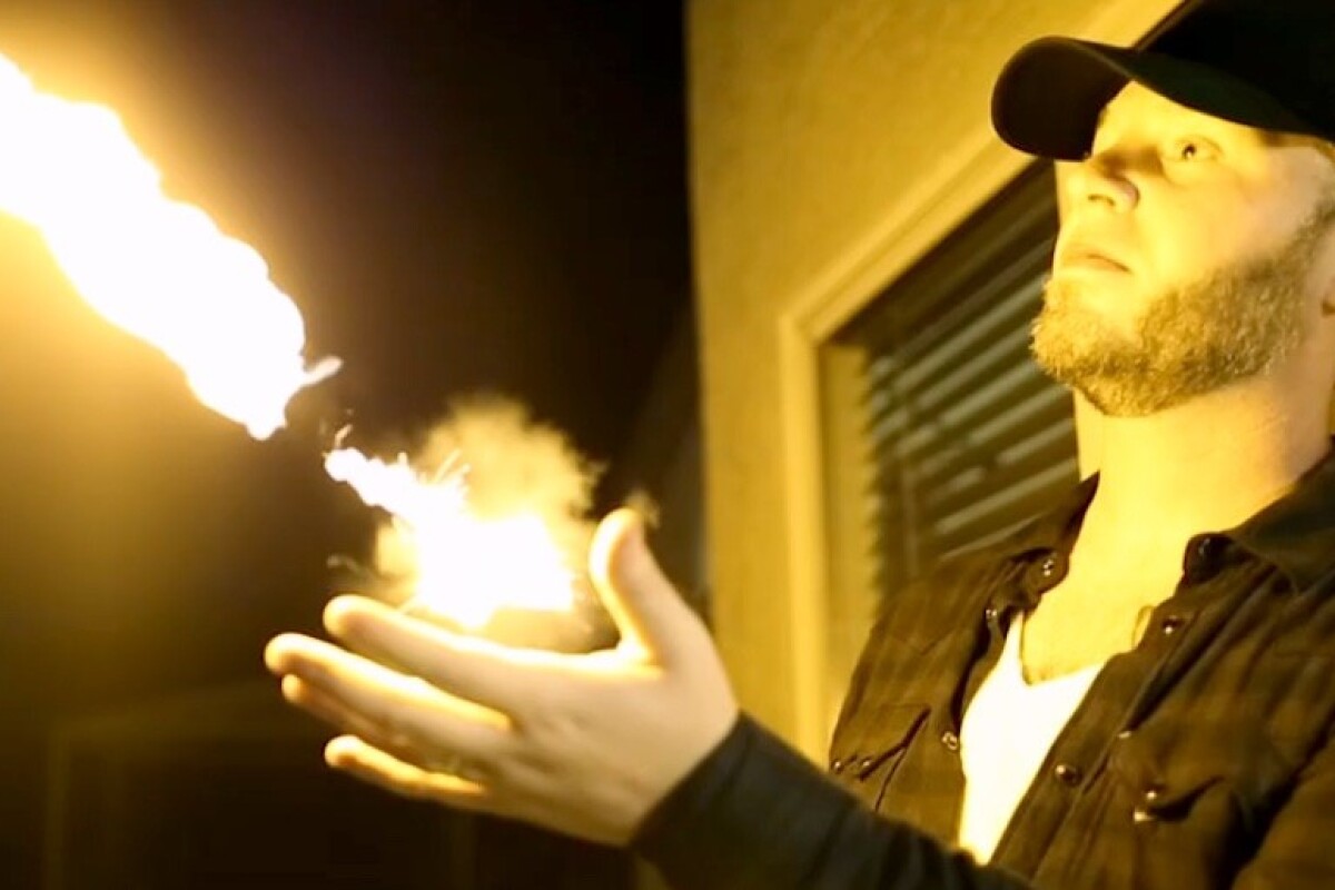 holding fireball pose