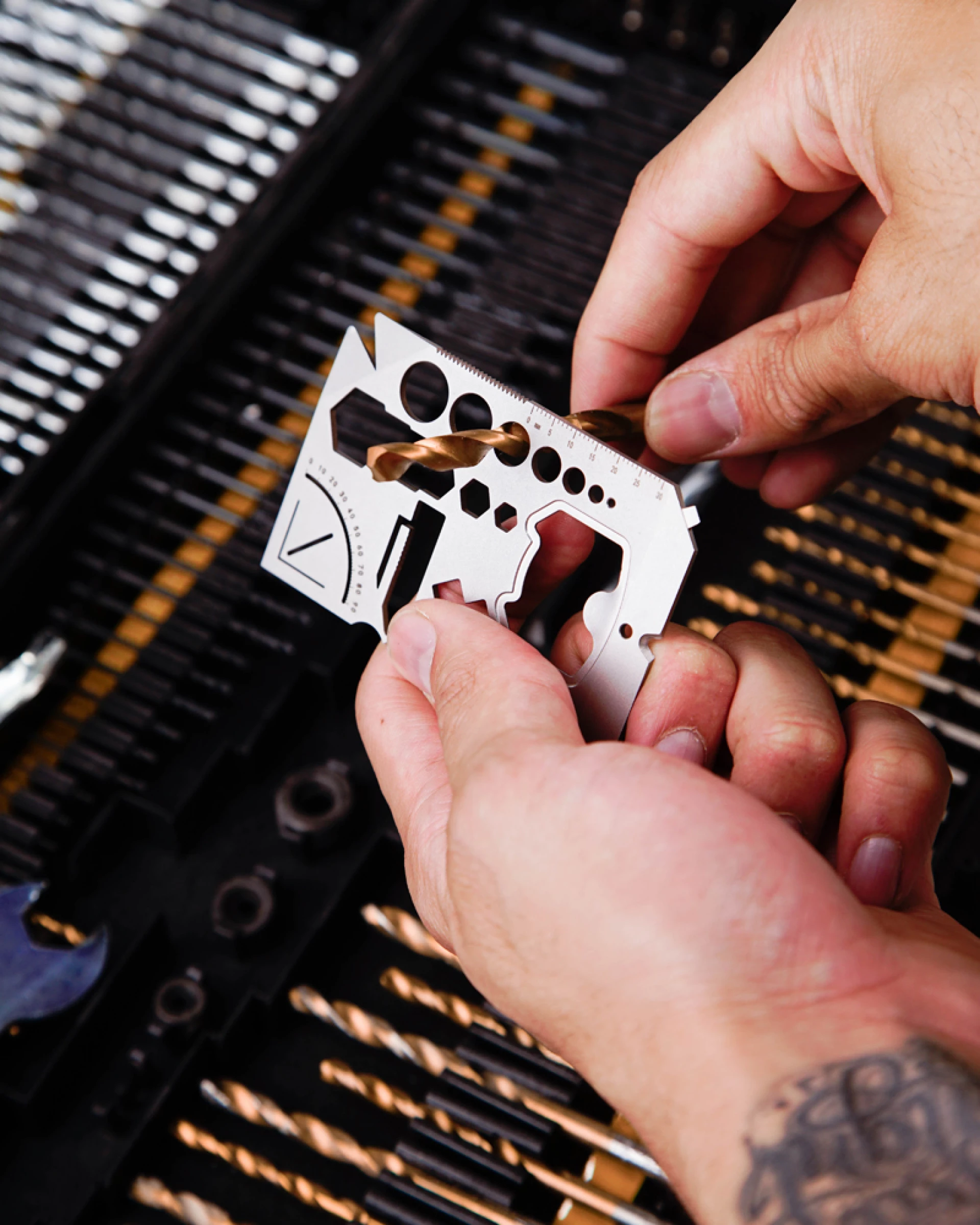 MultiCard Multitool slides out of your wallet to perform over 21 tasks
