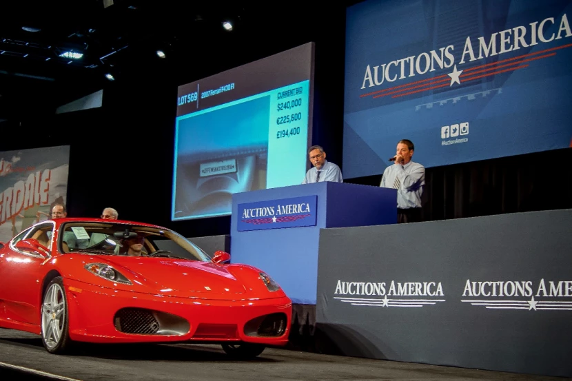 Donald Trump's Ferrari F430 wins celebrity car auction shoot-out