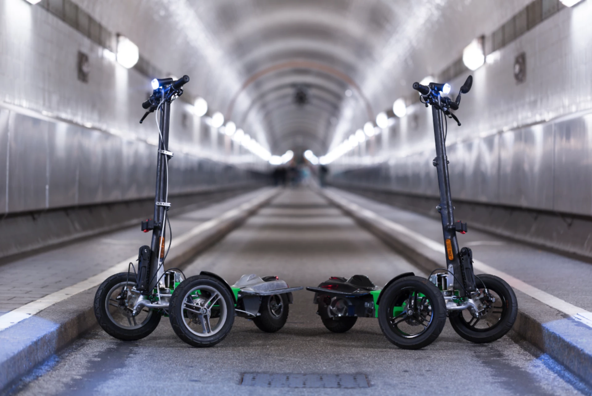 The Scuddy electric folding scooter stands up, sits down and trolleys
