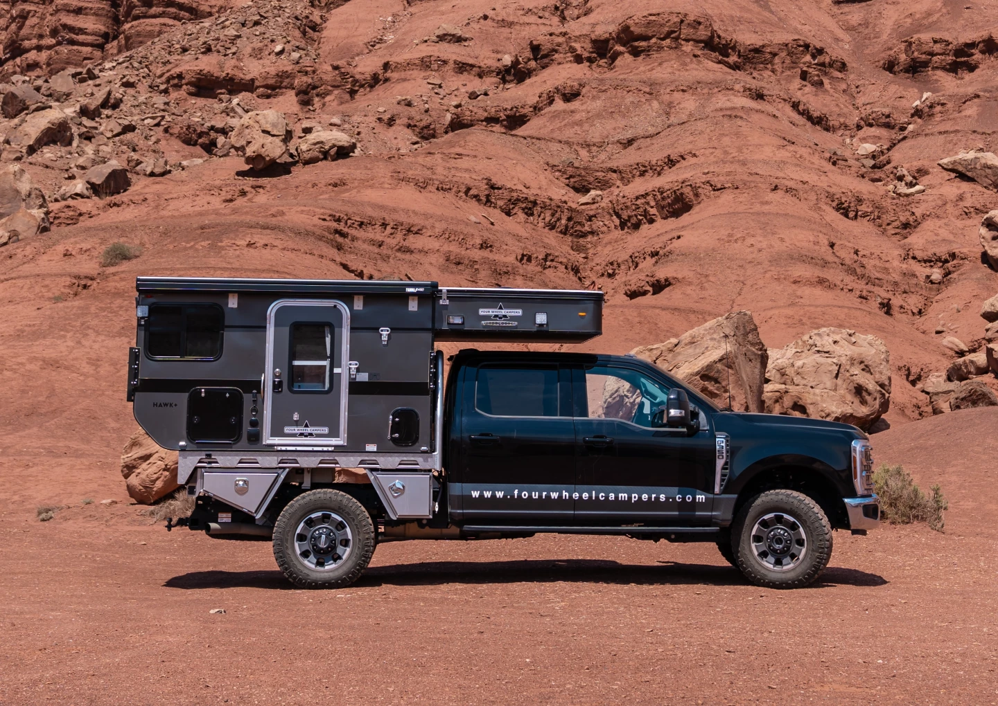 Four Wheel Campers Hawk+ self-contained off-grid pickup truck camper