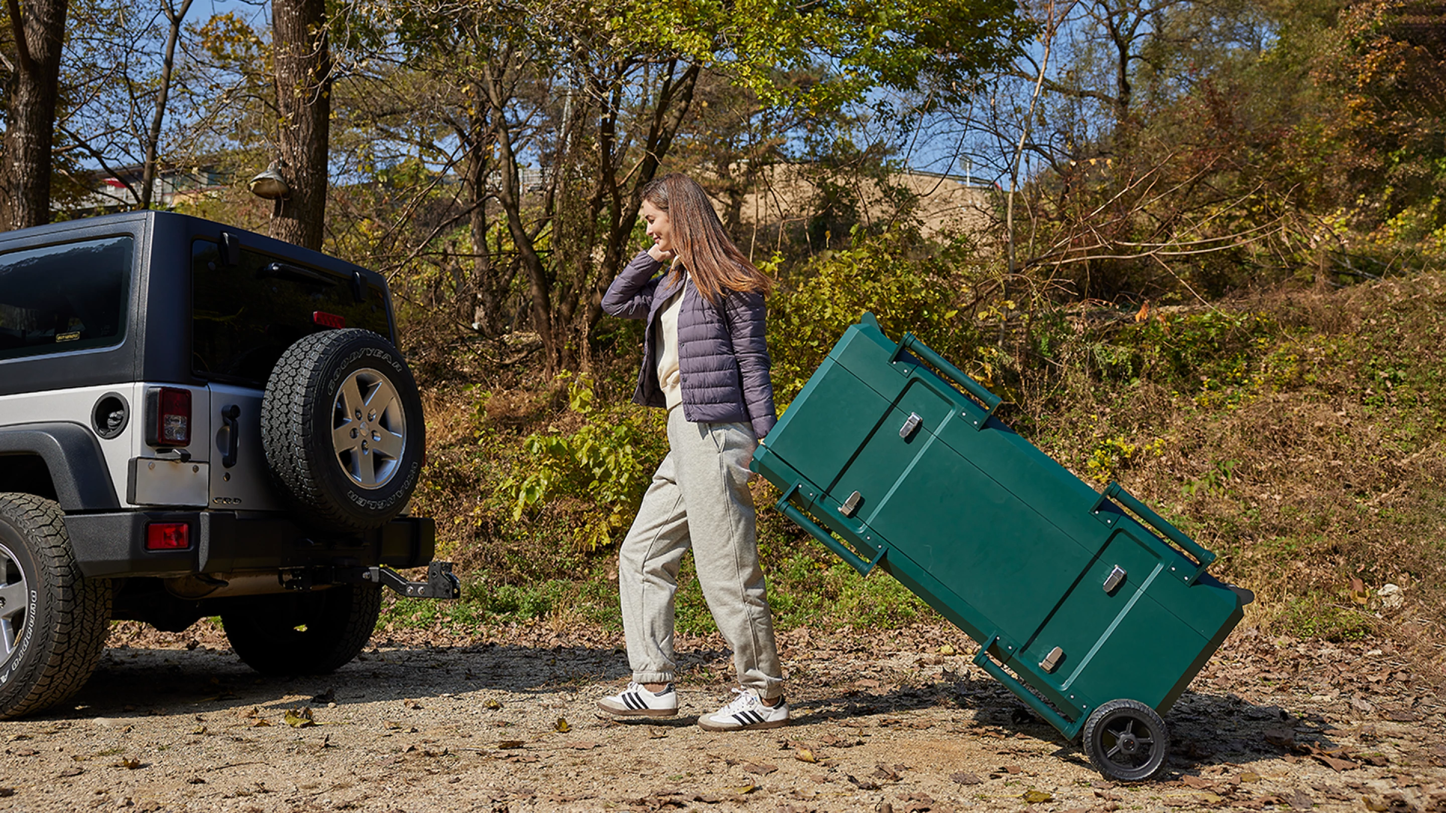 Rolling tent hitches a ride and inflates into above-ground abode