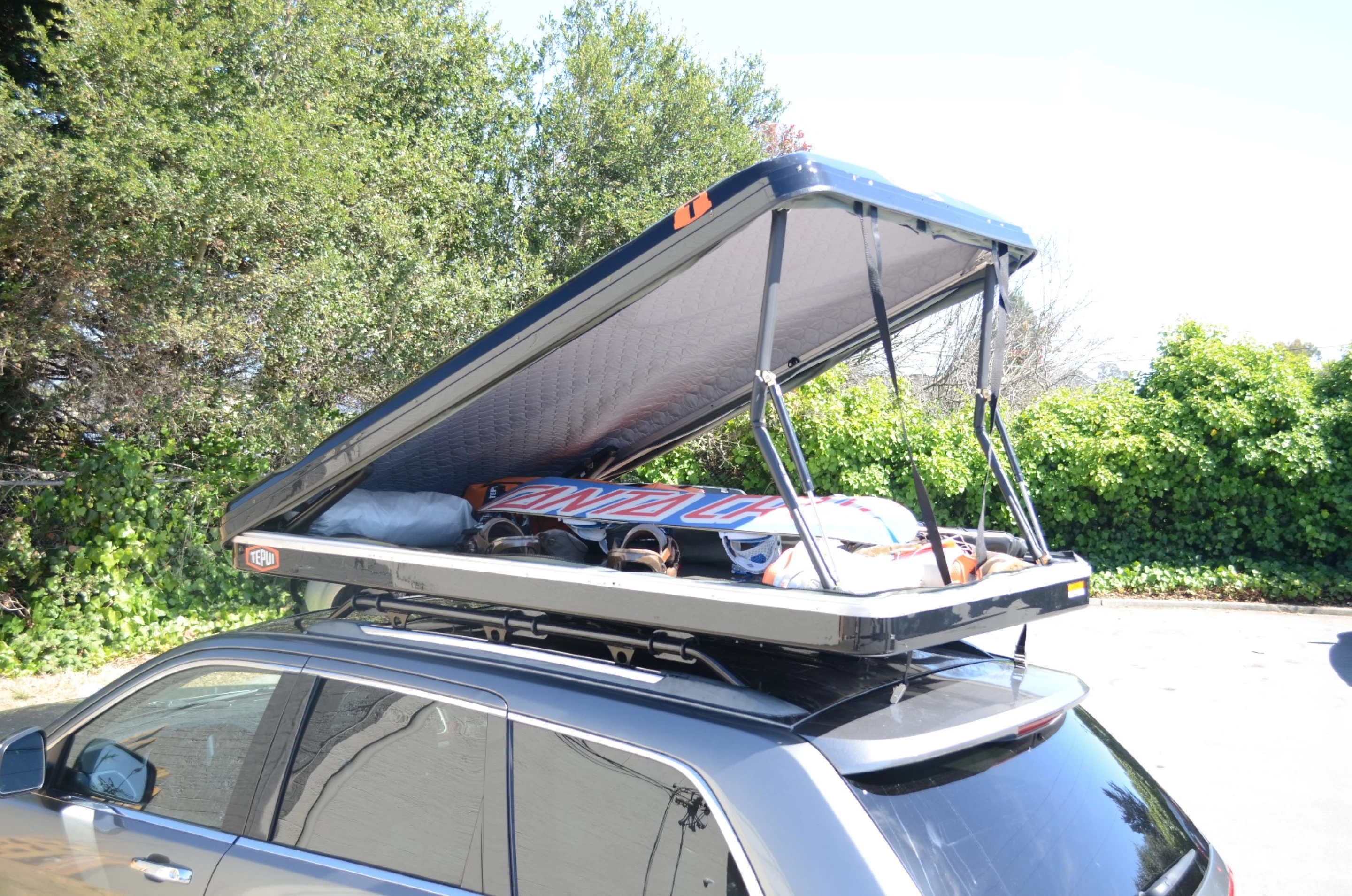 Tepui's vehicle cargo box moonlights as a roof-top tent