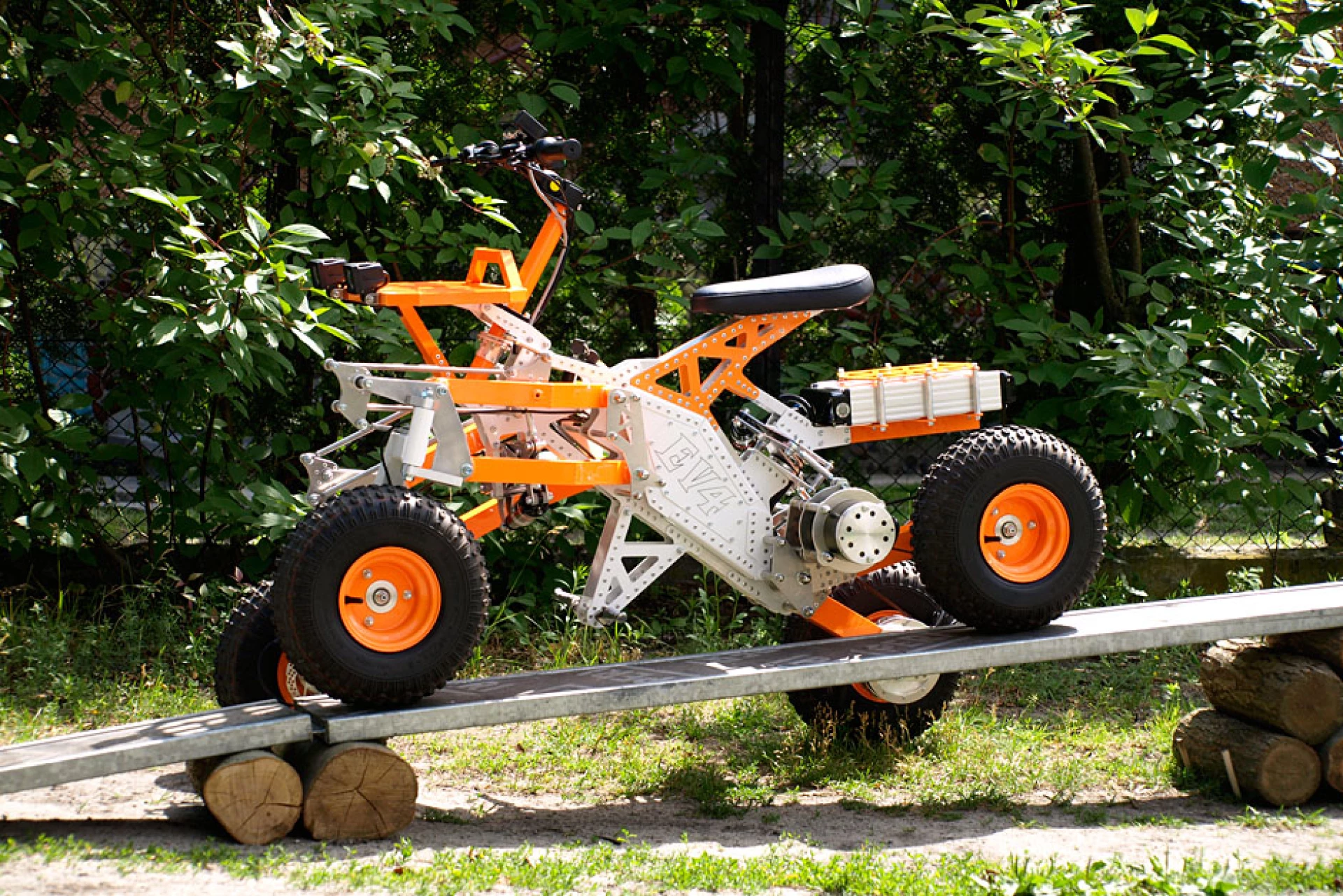 Tilting electric quad gets menacing off-road big brother