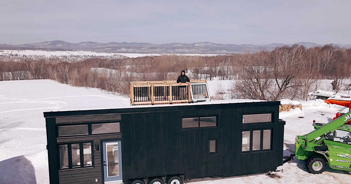 Luxury tiny house offers home comforts inside and a deck up top