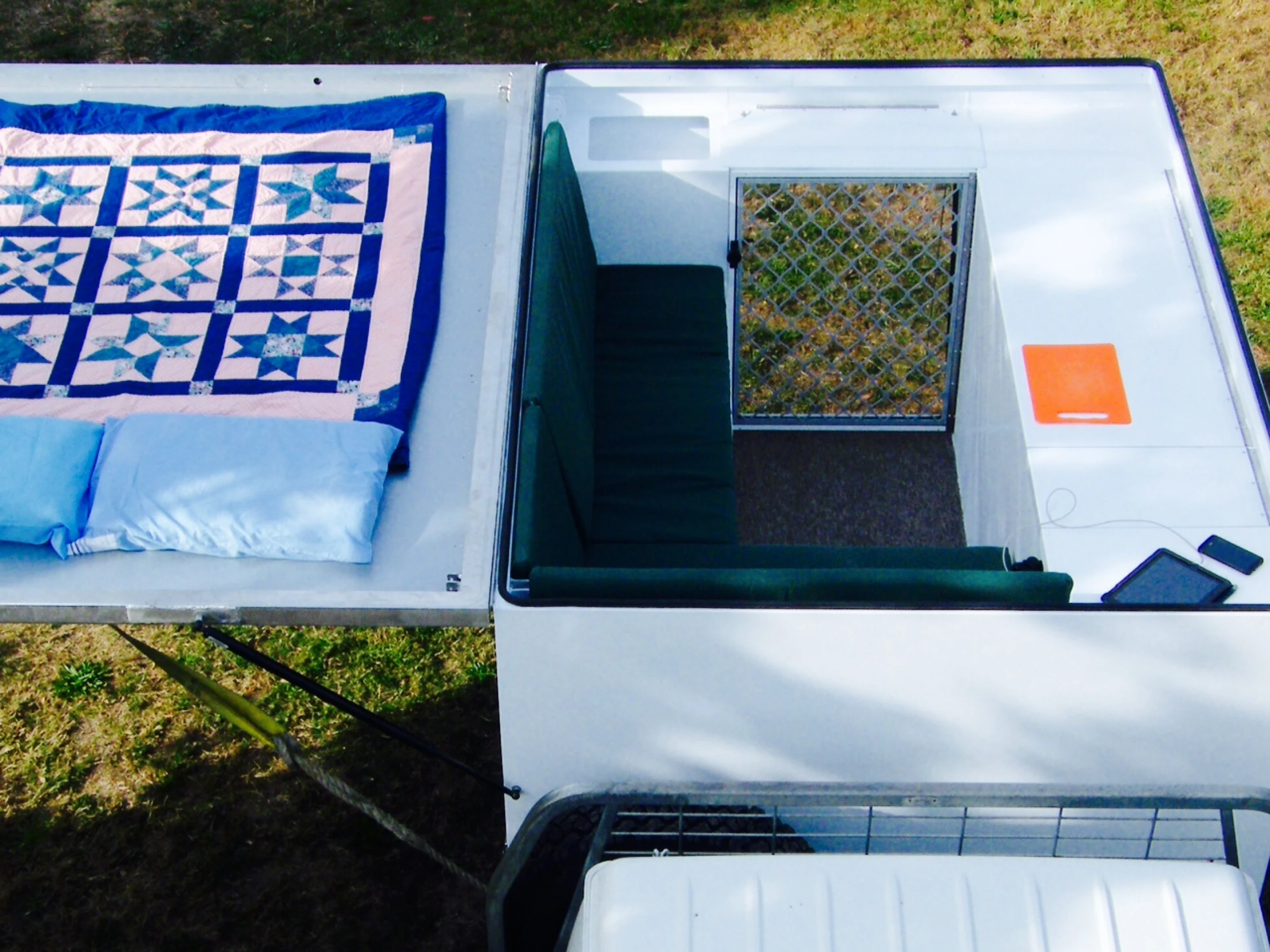 Gecko camper flips and folds to make your truck home