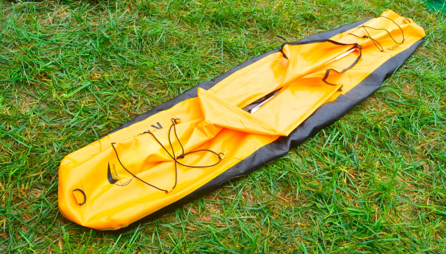 Backpackable boat unfolds and inflates into paddling form