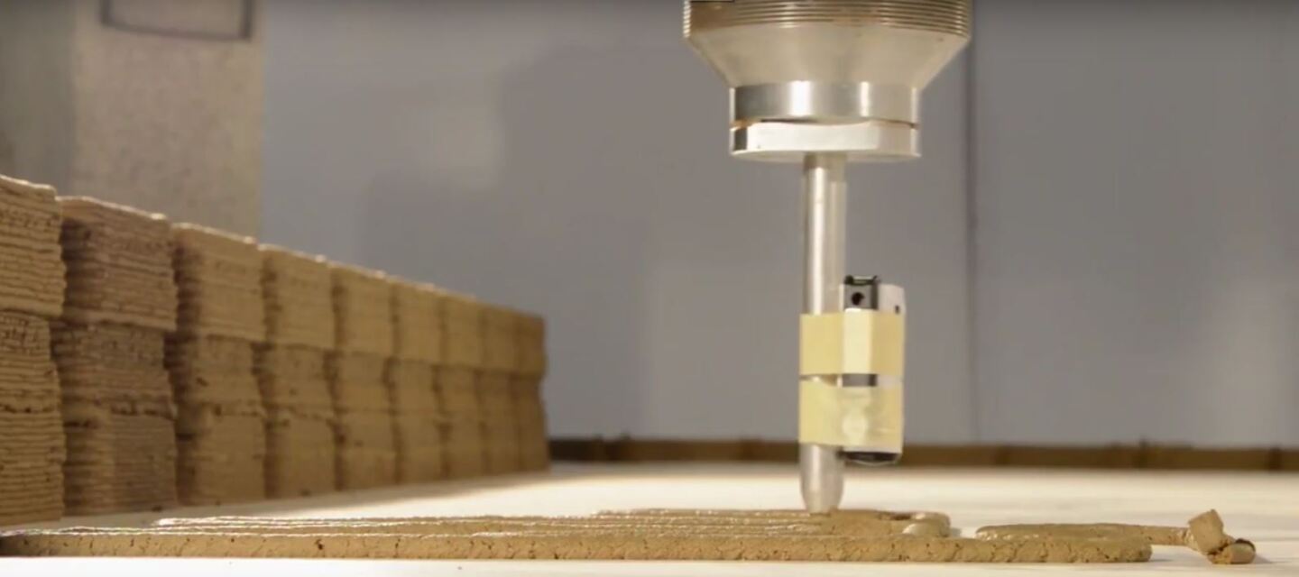 Cable-driven robot monitors buildings as it prints them Cable-driven robot monitors buildings as it prints them