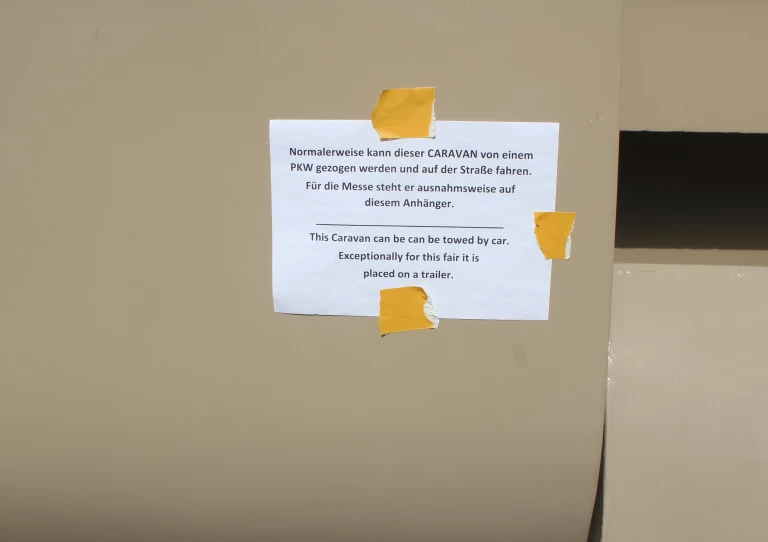 "Unsinkable" amphibious caravan flips wheels into hulls to float-camp