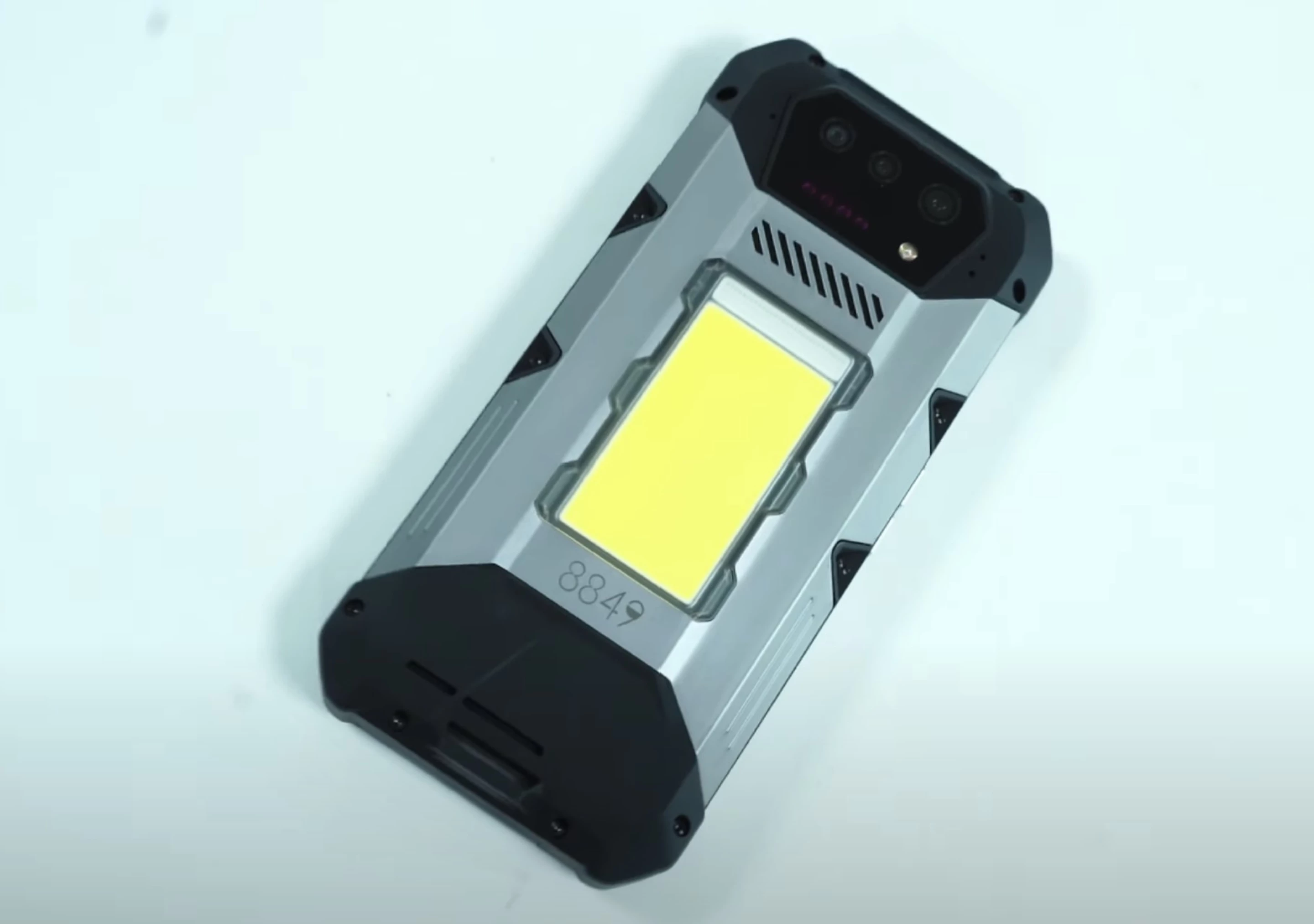 Rugged phone with dual flashlights for adventurers