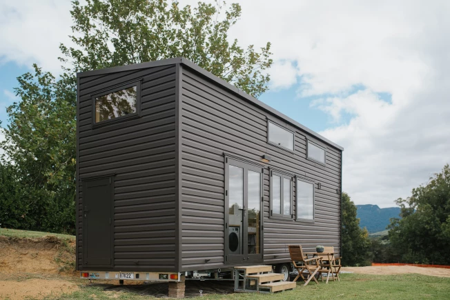 Nugget tiny house doubles up on staircases and storage space