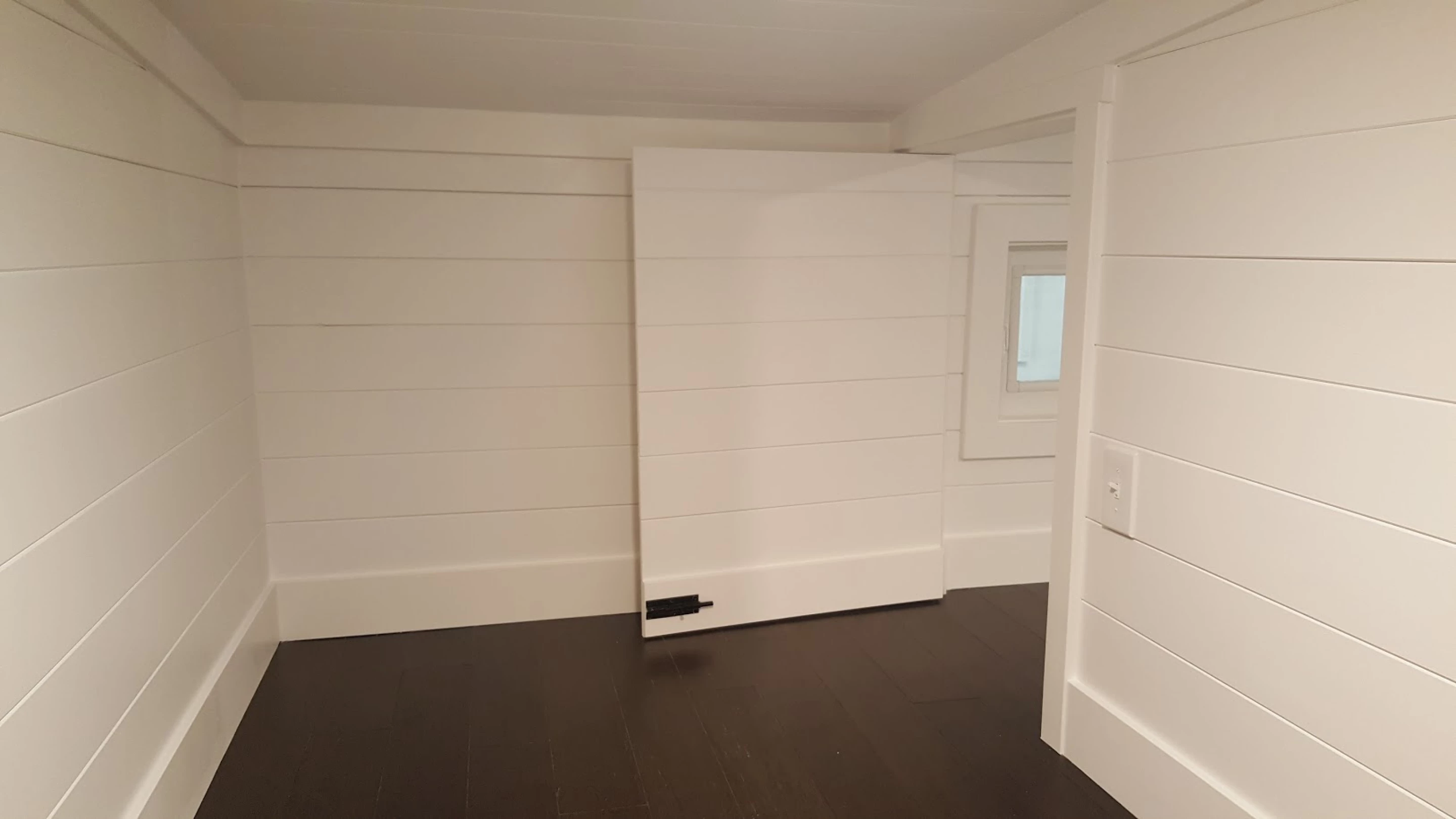 Tiny house with flexible interior sleeps up to six