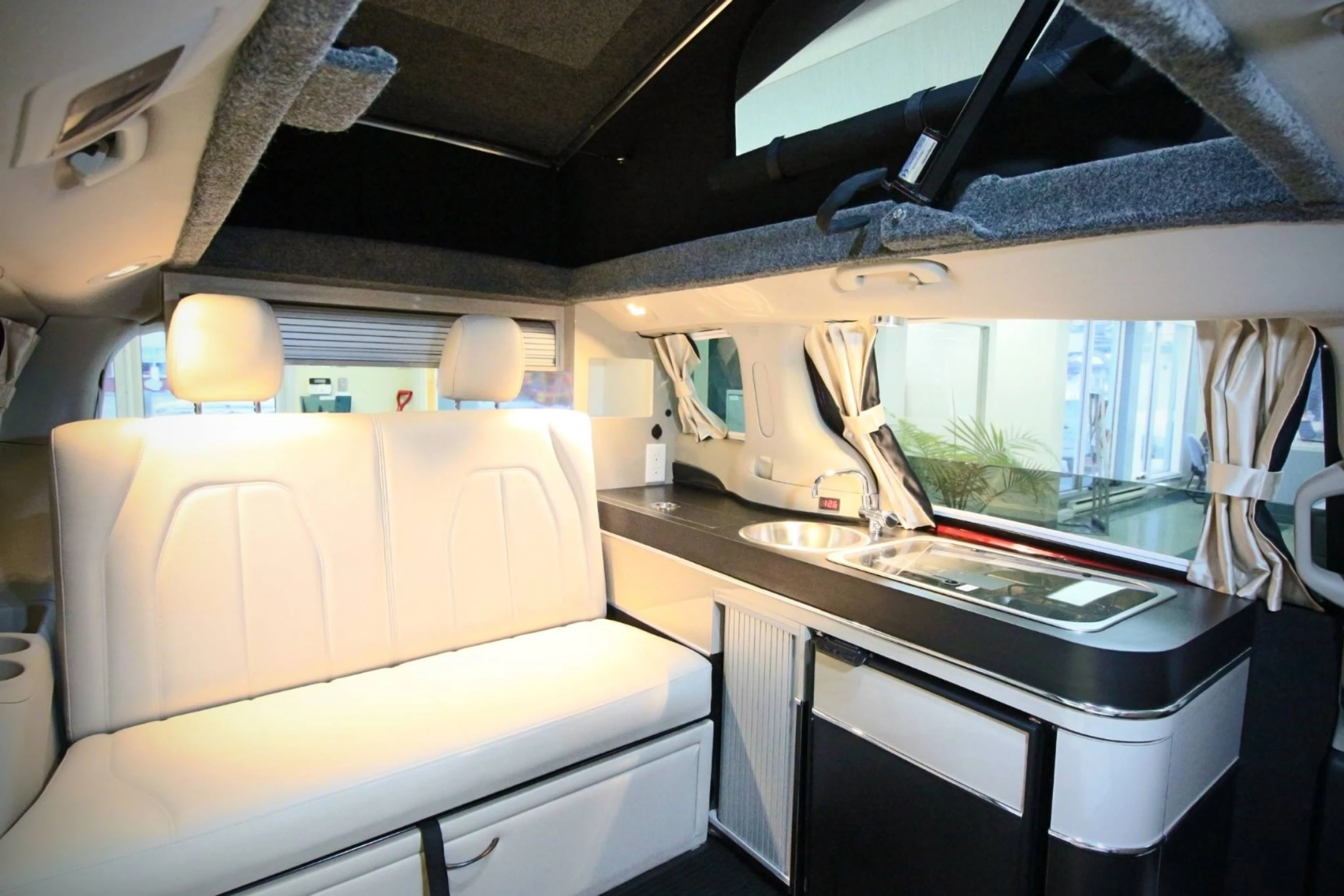 5 Mars makes a colorful, efficient mini-campervan out of the Chrysler ...