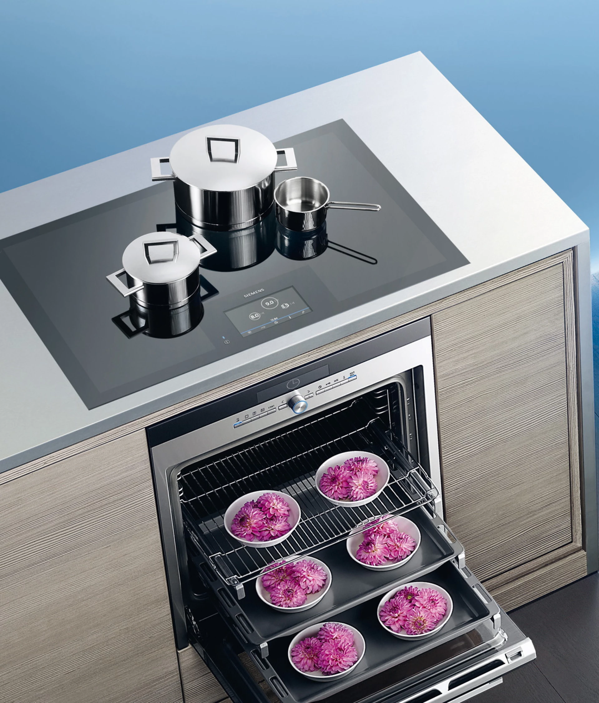 Siemens full-surface induction cooktop lets you arrange the pans ...