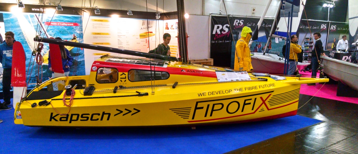 Solar-assisted, volcanic-composite sailing yacht navigating world's ...