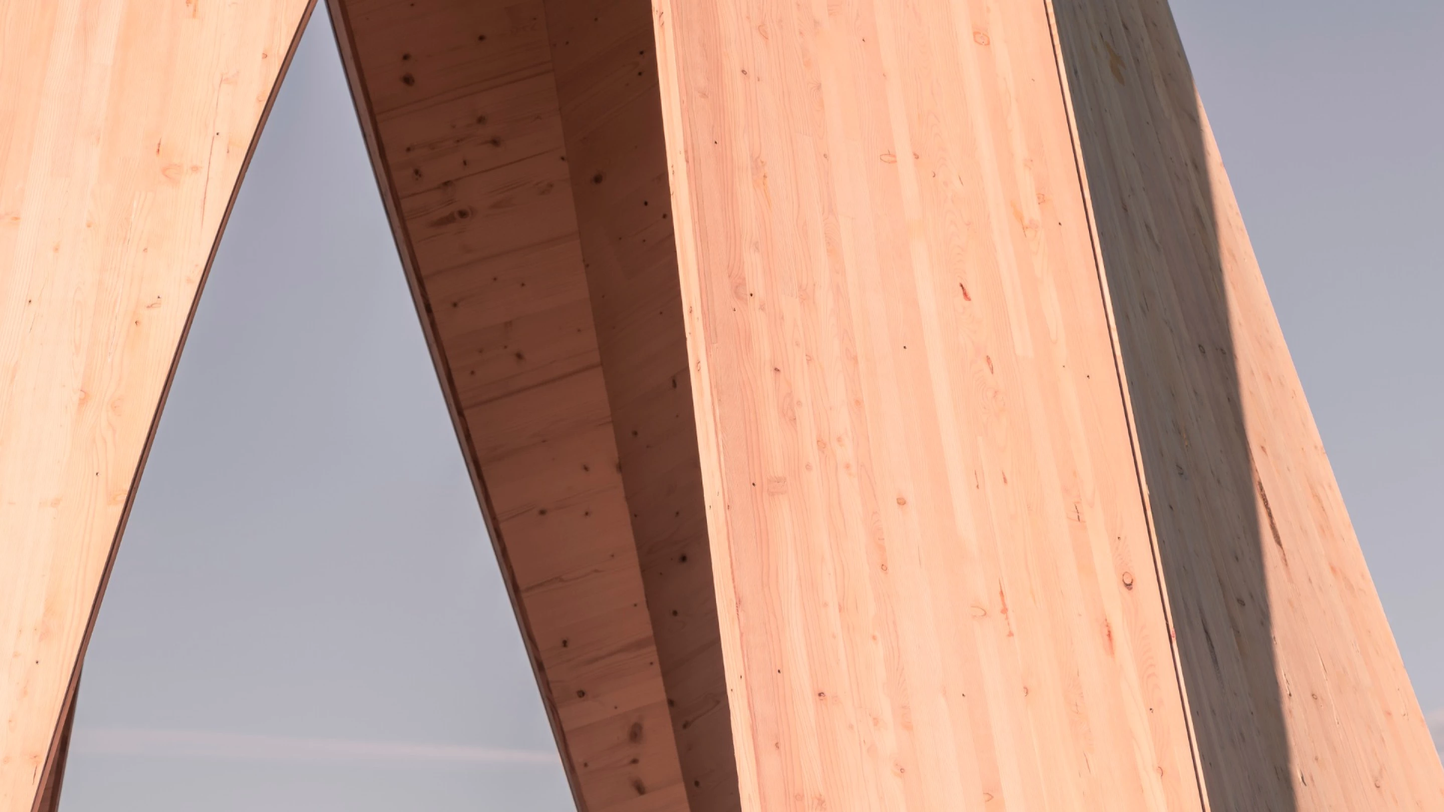 "World-first" twisting tower is made from timber that bends itself into ...