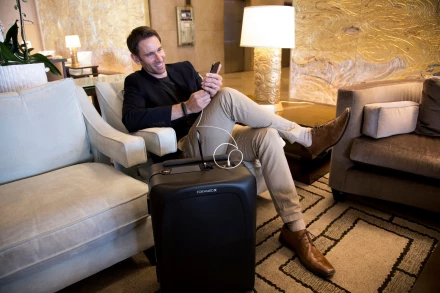 Motorized AI-packin' suitcase keeps its eyes on its owner