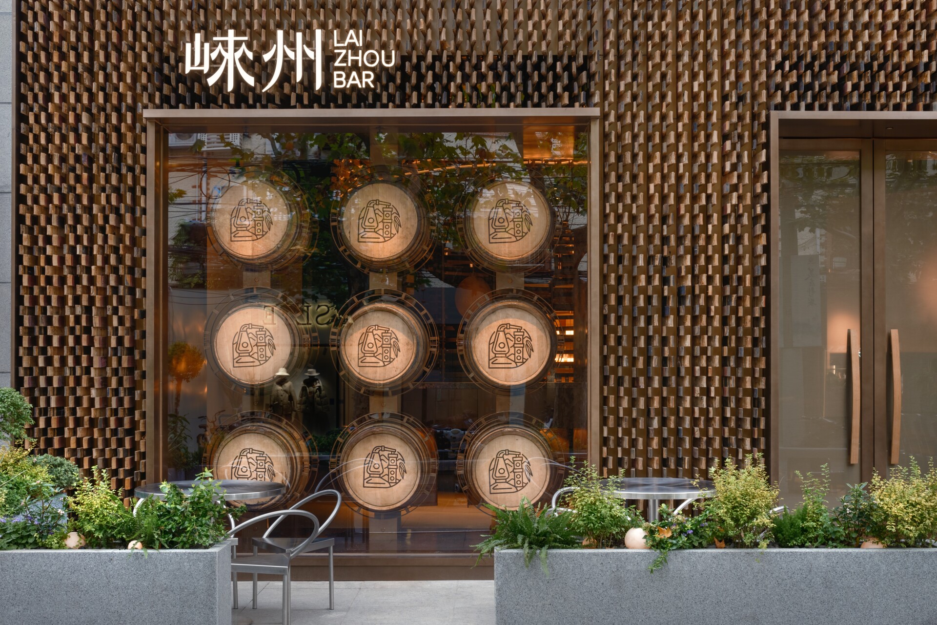 Discarded whiskey barrels used to form stunning one-of-a-kind bar